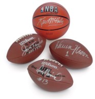 A GROUP OF FOUR AUTOGRAPHED SPORTS MEMORABILIA Christie s