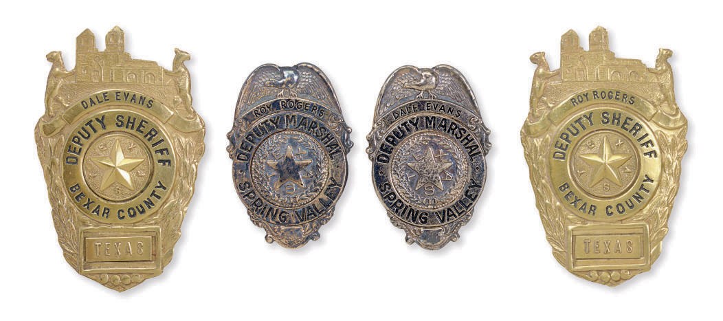 TWO PAIRS OF PERSONALIZED LAW ENFORCEMENT BADGES | Christie's