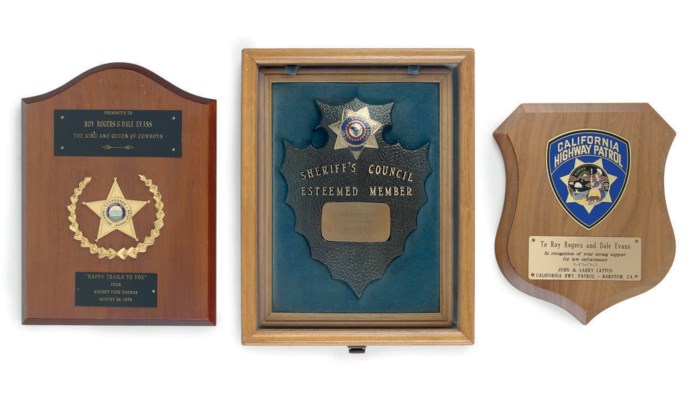 A GROUP OF PERSONALIZED LAW ENFORCEMENT PLAQUES | Christie's