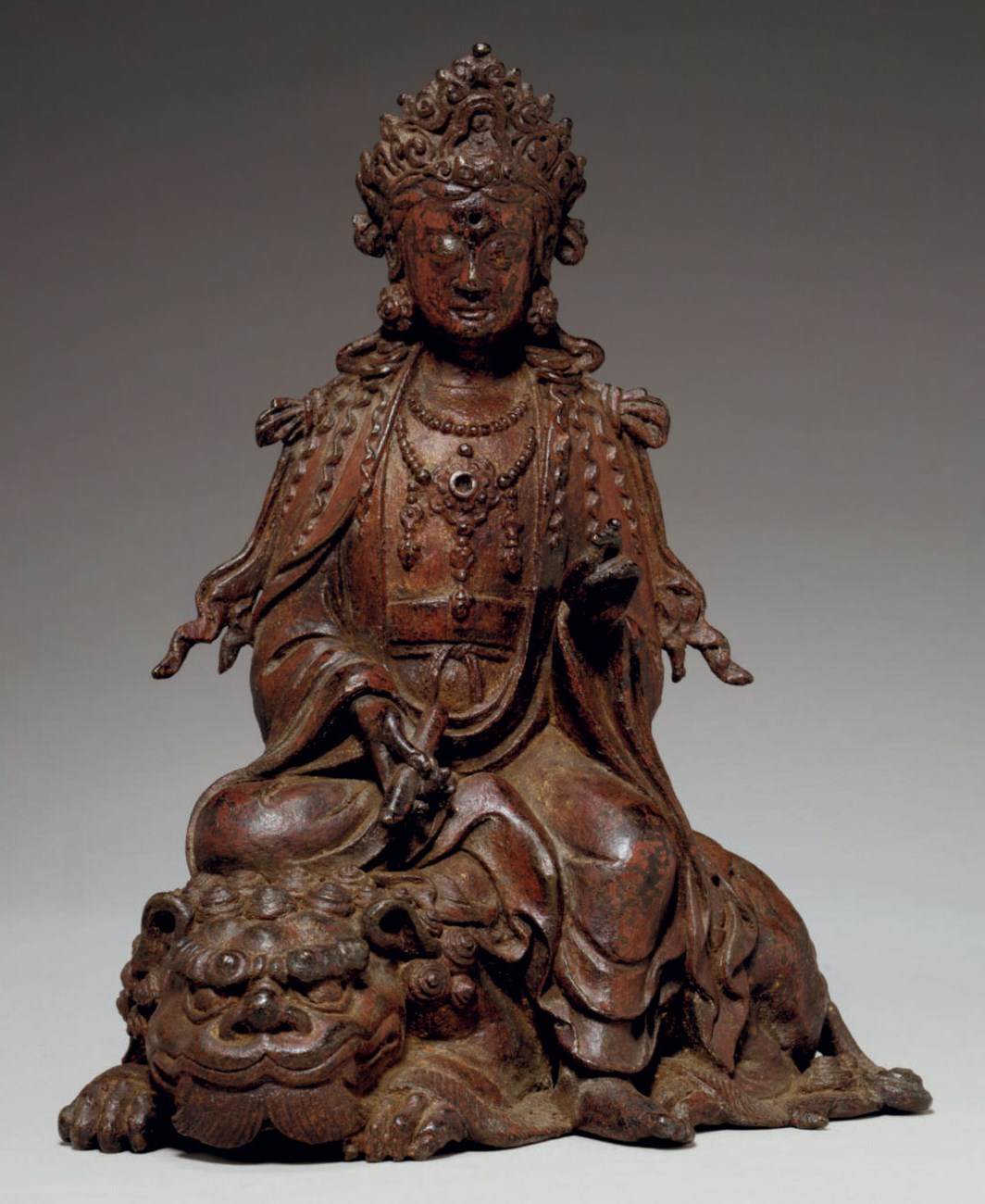 A RARE LACQUERED BRONZE FIGURE OF MANJUSRI , 13TH/14TH CENTURY | Christie's