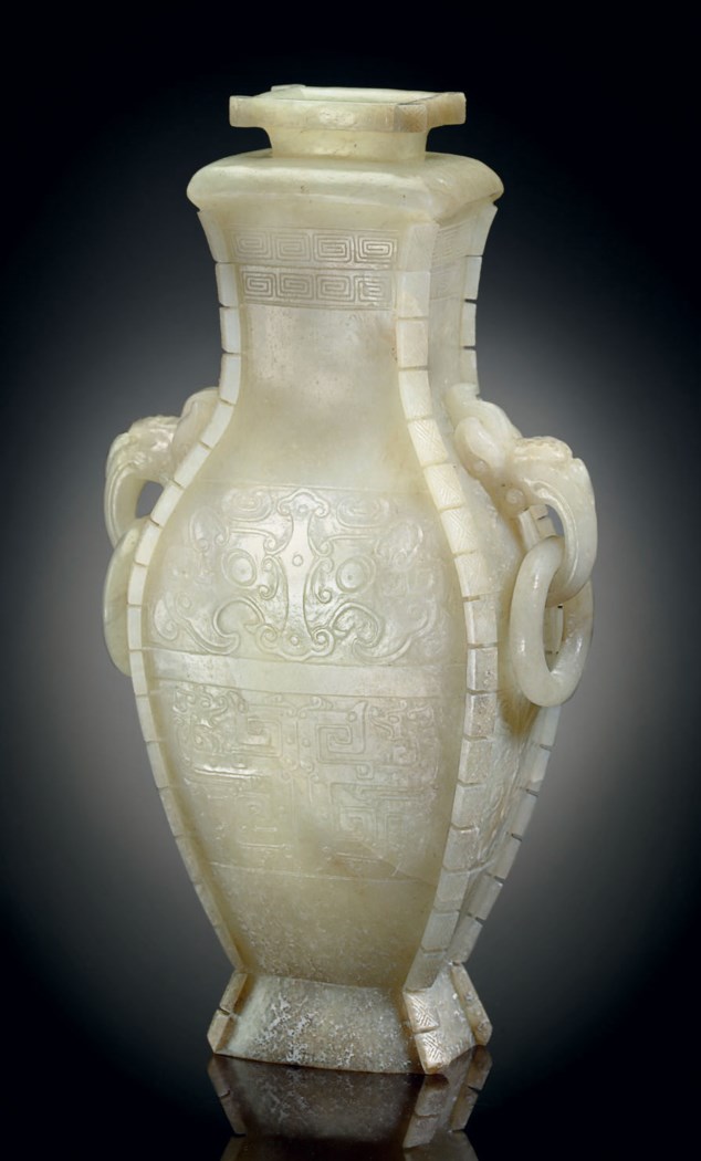 A PALE BEIGE JADE ARCHAISTIC FACETED VASE AND COVER , 19TH CENTURY ...