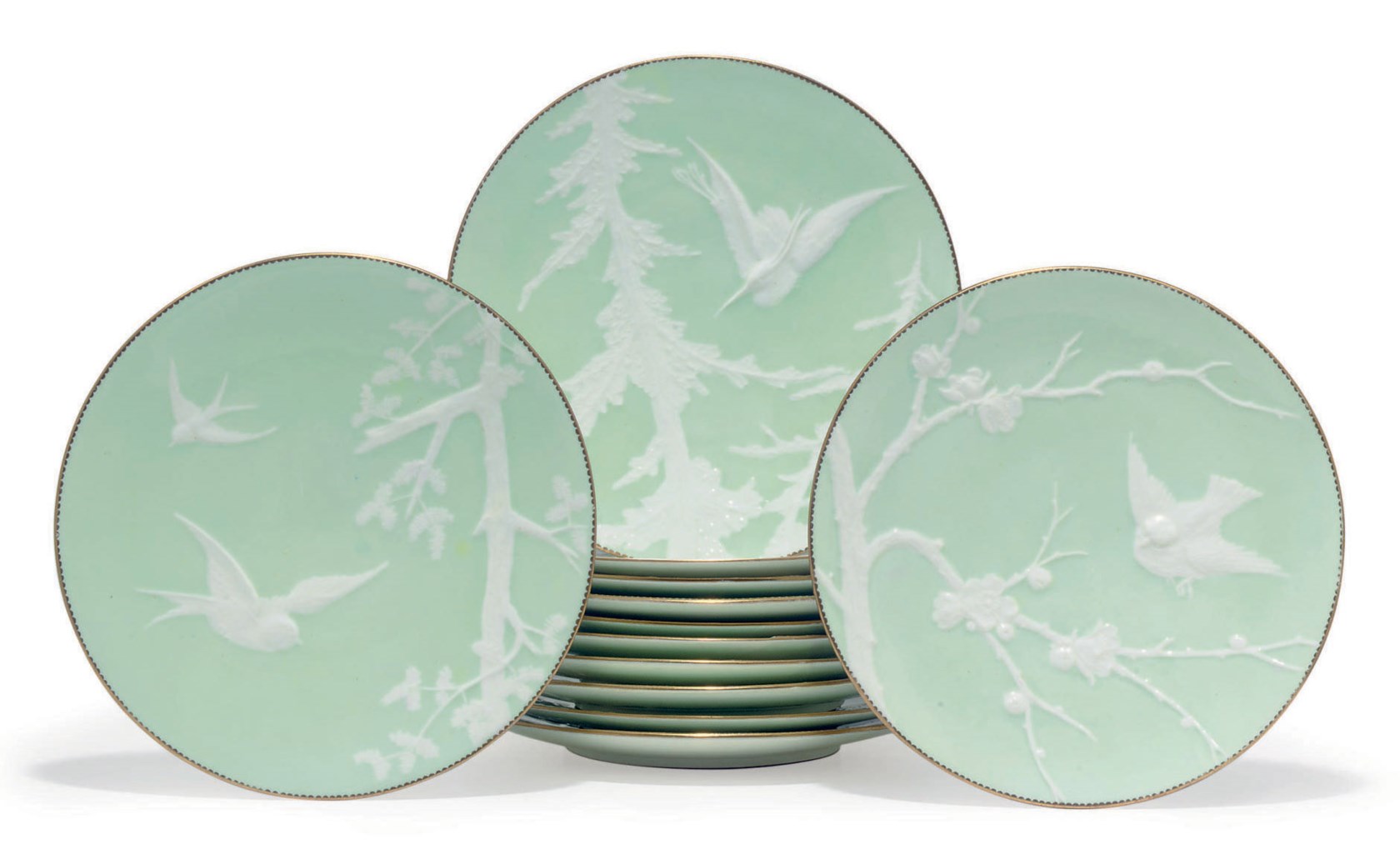 TWELVE ENGLISH (E.J.D. BODLEY) PORCELAIN RELIEF-MOLDED CELADON-GROUND ...