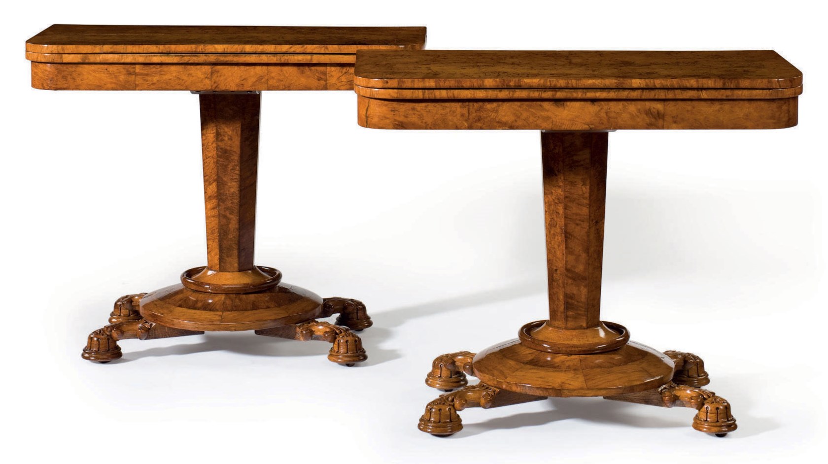 A PAIR OF CENTRAL EUROPEAN BIRCH AND OAK GAMES TABLES , PROBABLY GERMAN ...