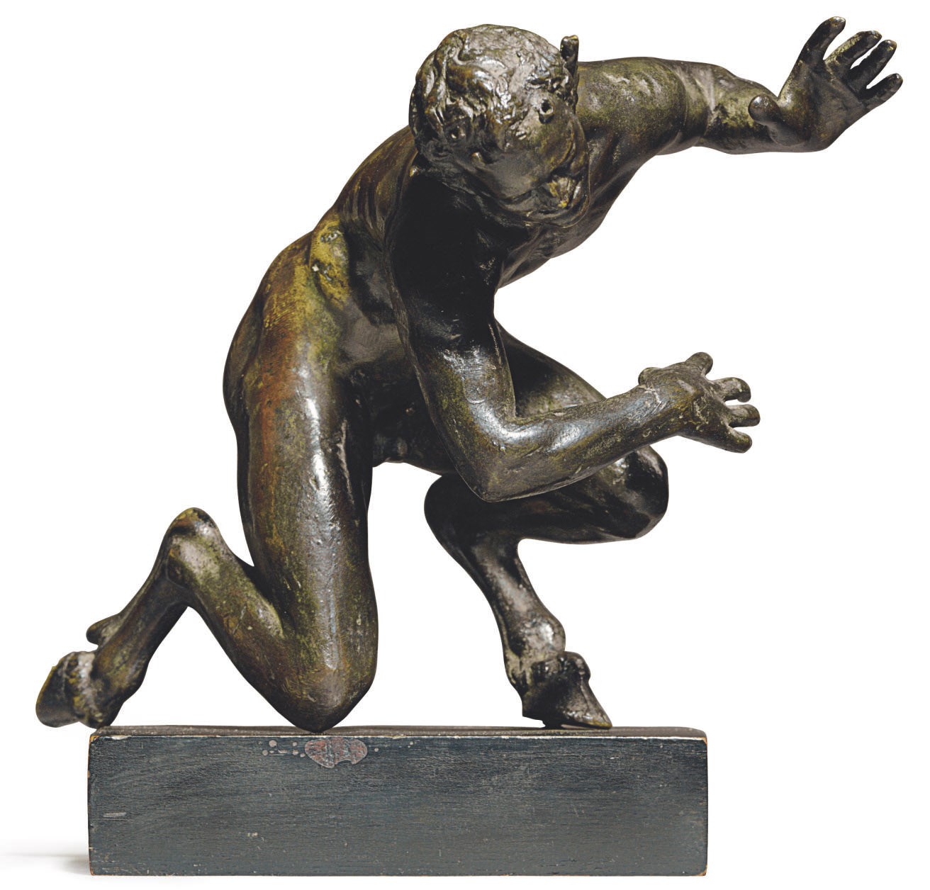 A BRONZE FIGURE OF A CROUCHING SATYR