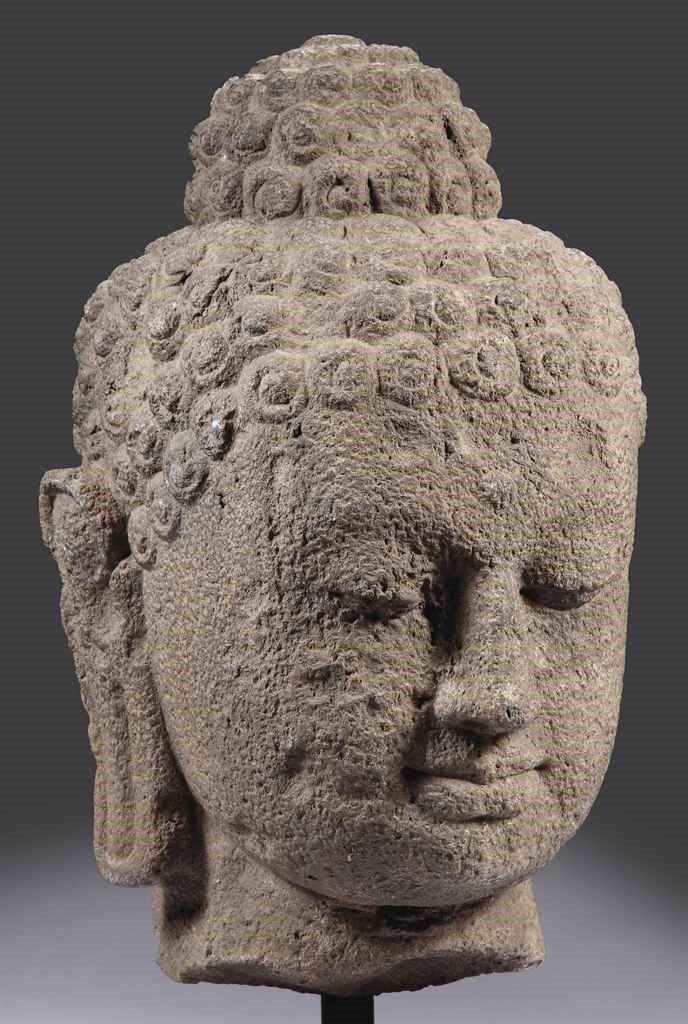 A Javanese volcanic stone head of Buddha Shakyamuni , 9TH CENTURY ...