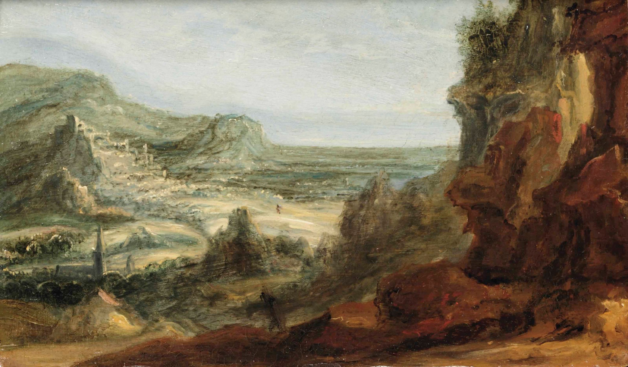 Circle of Joos de Momper II (Antwerp 1564-1635) , An extensive mountainous landscape with a town ...
