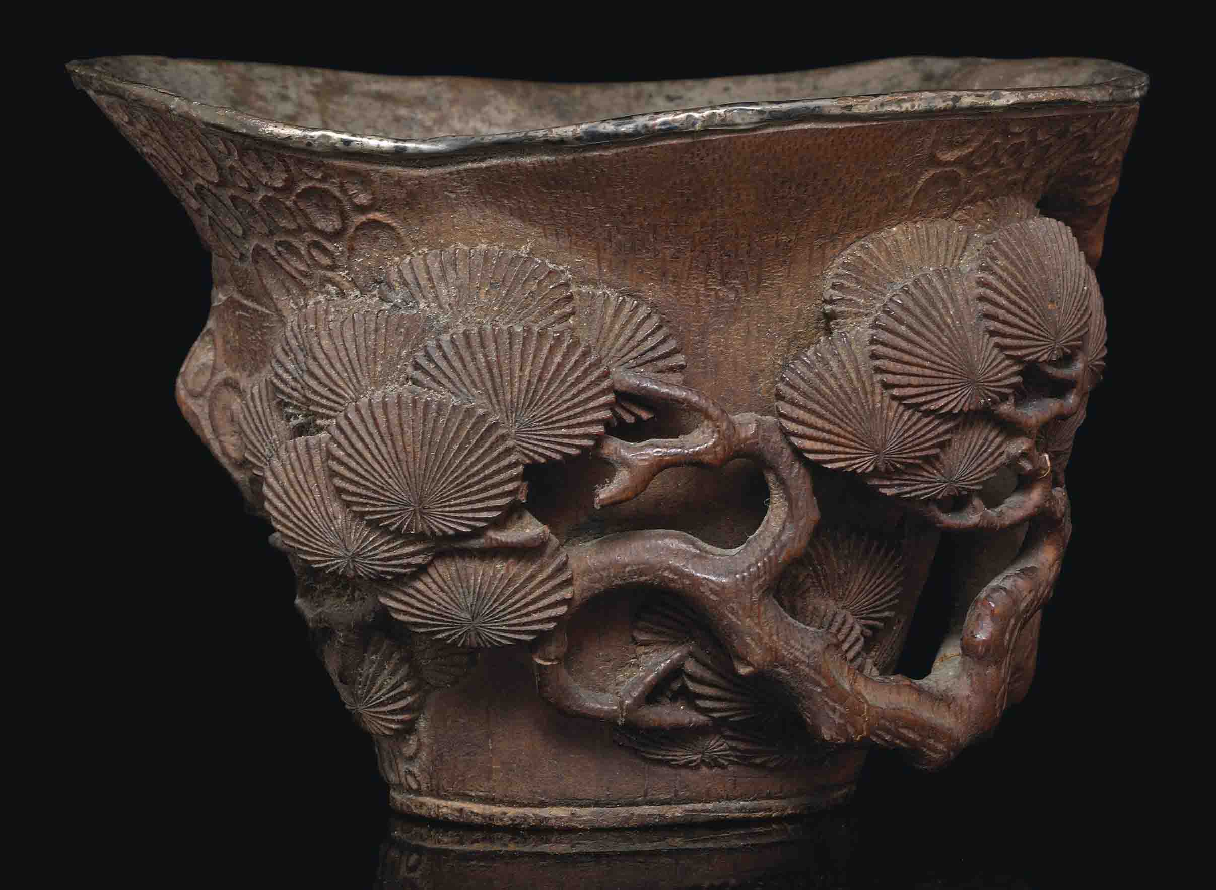 A RHINOCEROS HORN LIBATION CUP , 17TH CENTURY | Christie's