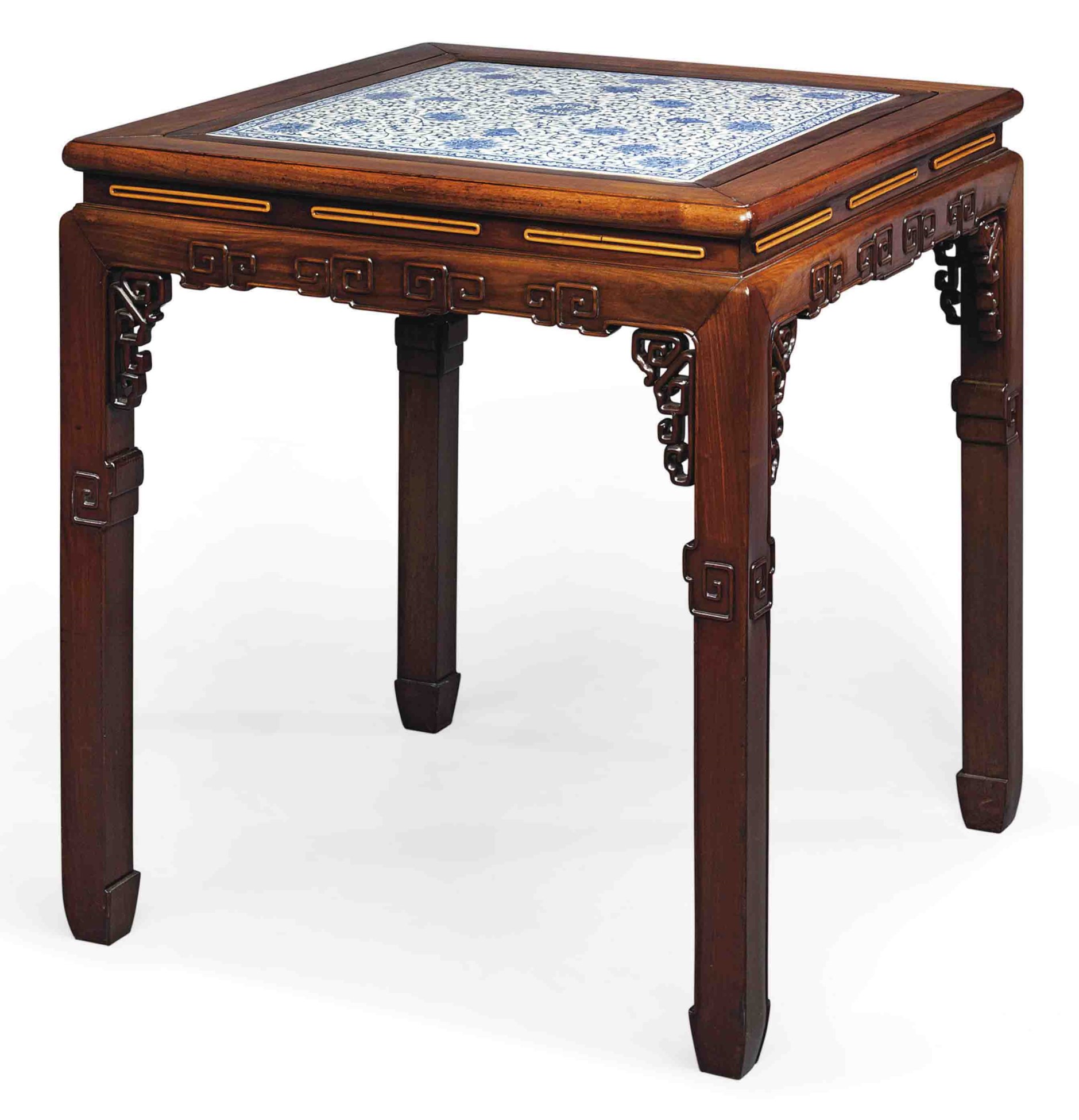 A BLUE AND WHITE PORCELAIN PLAQUE SET WITHIN A HONGMU TABLE , THE ...