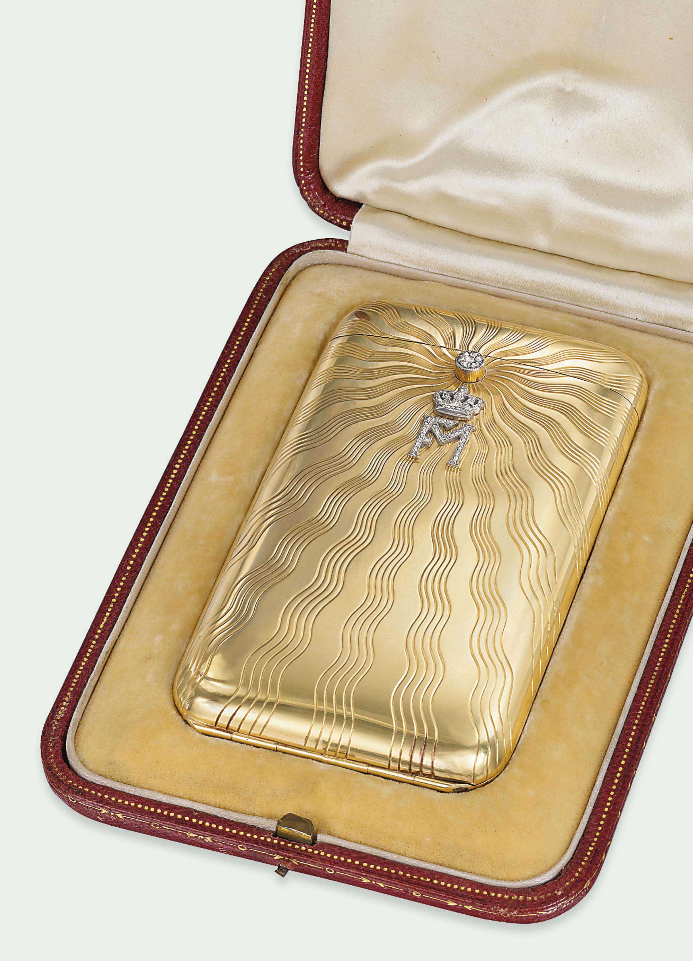 AN EARLY 20TH CENTURY ROYAL PRESENTATION CIGARETTE CASE, BY CARTIER