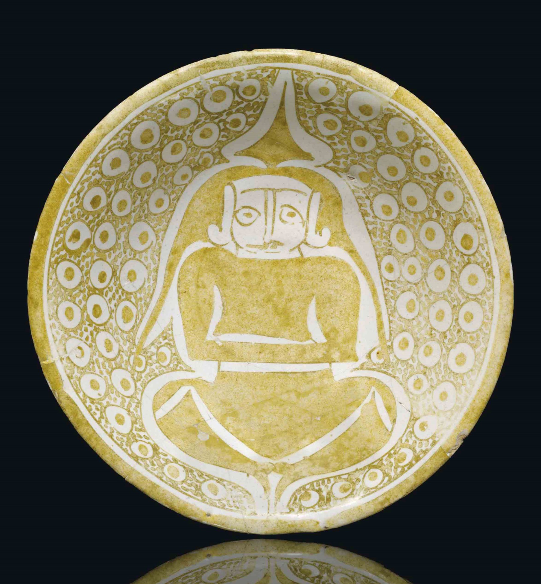 AN ABBASID FIGURAL MONOCHROME LUSTRE POTTERY BOWL
