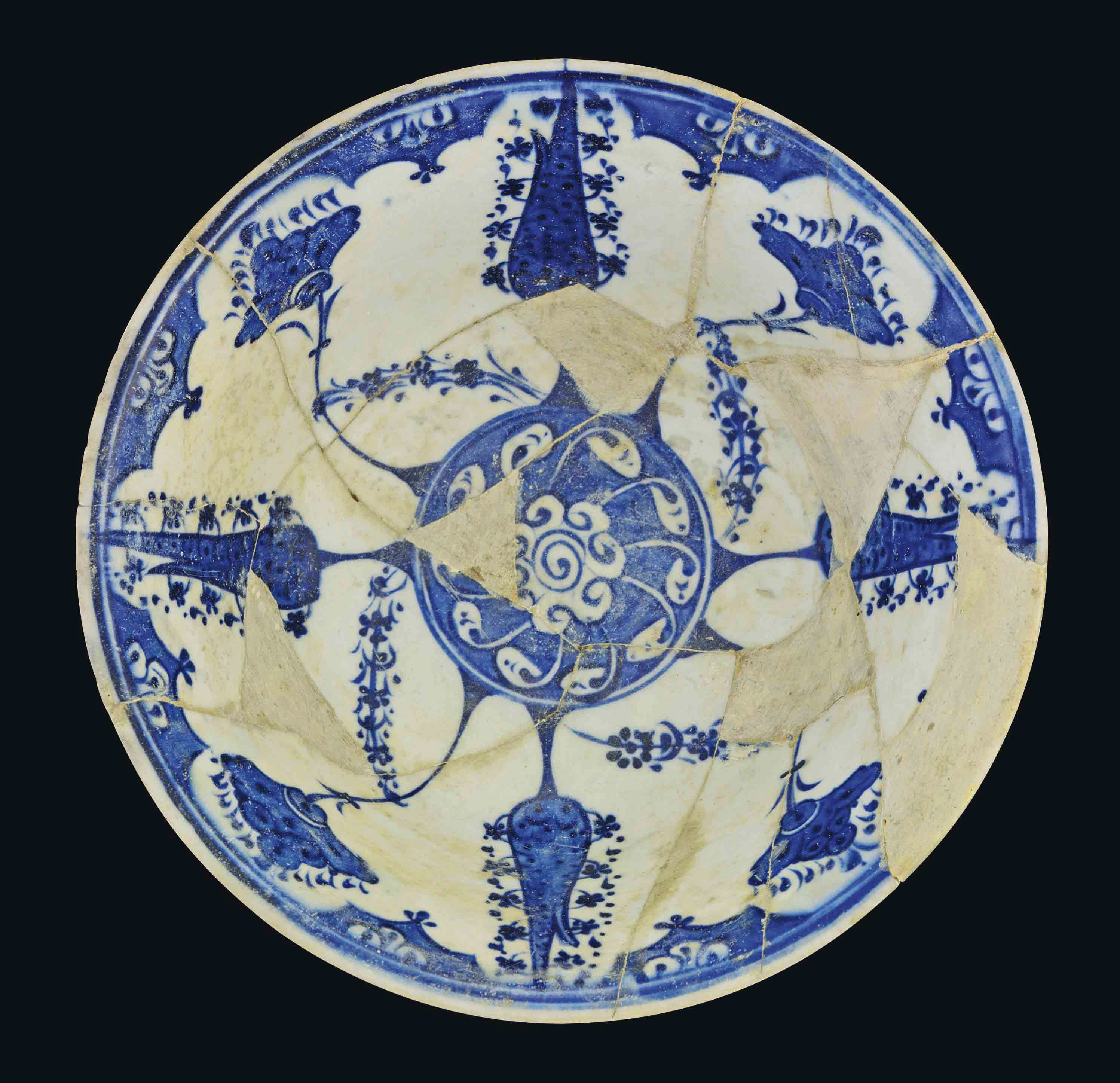AN IZNIK BLUE AND WHITE POTTERY BOWL , OTTOMAN TURKEY, CIRCA 1520 ...