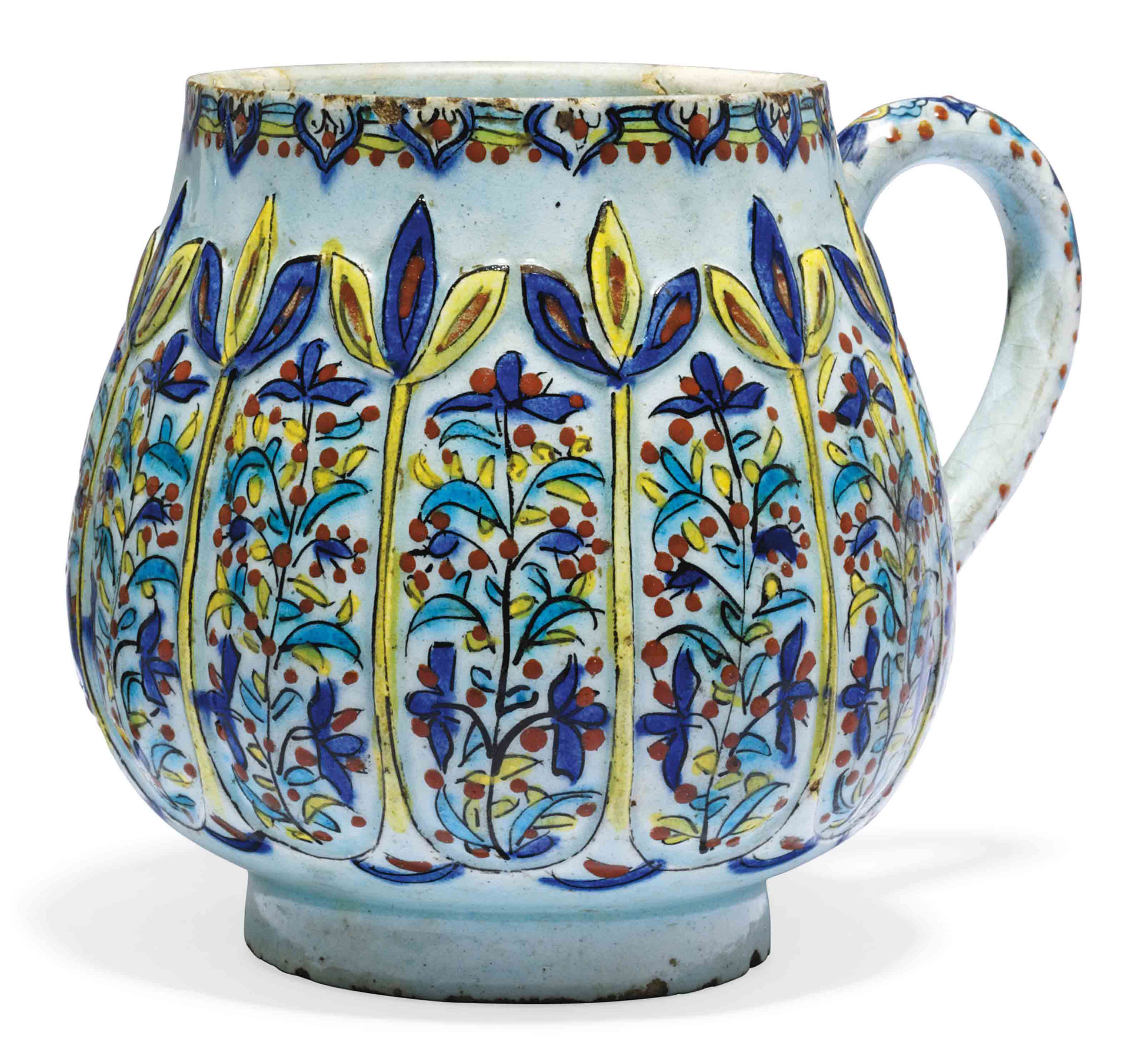 A KUTAHYA MOULDED TURQUOISE POTTERY JUG