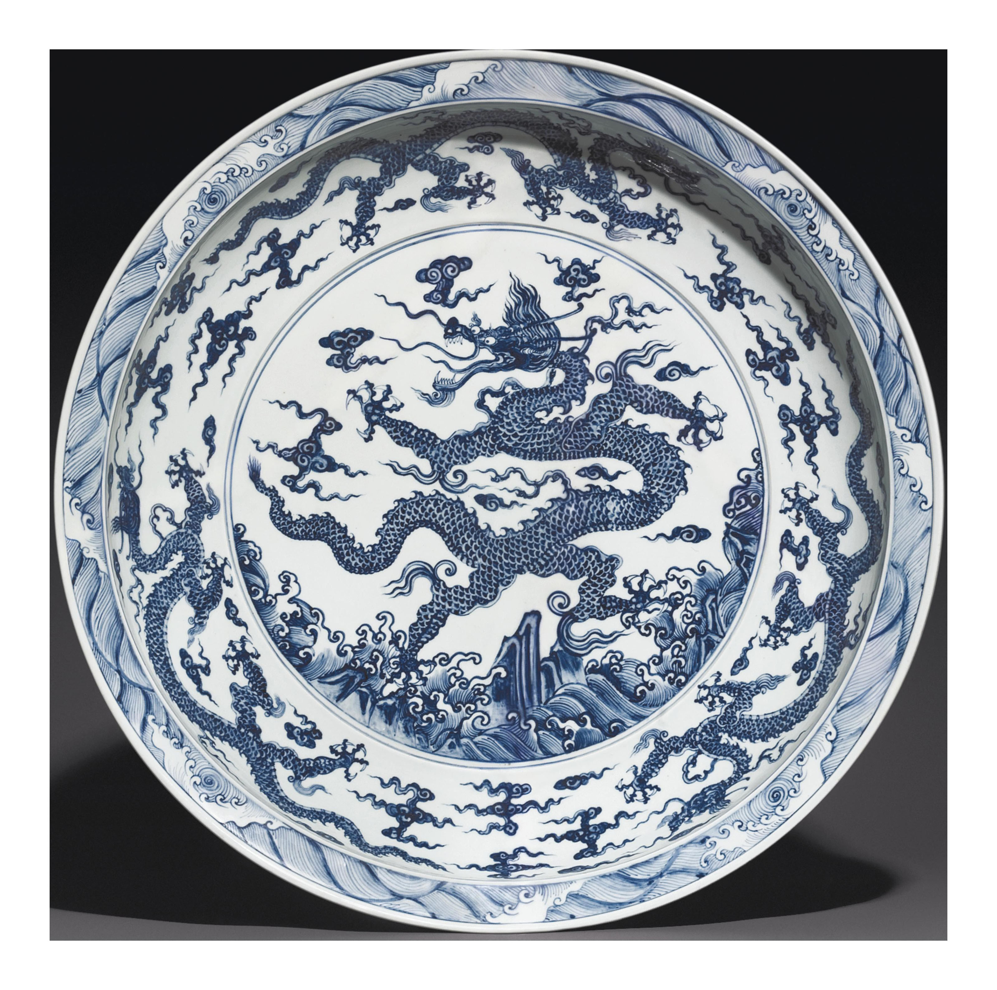 A MASSIVE MING-STYLE BLUE AND WHITE 'DRAGON' CHARGER