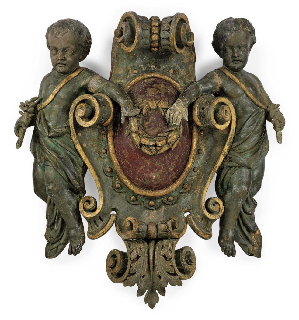 AN ITALIAN PARCEL-GILT AND POLYCHROME-DECORATED ARCHITECTURAL CARTOUCHE ...