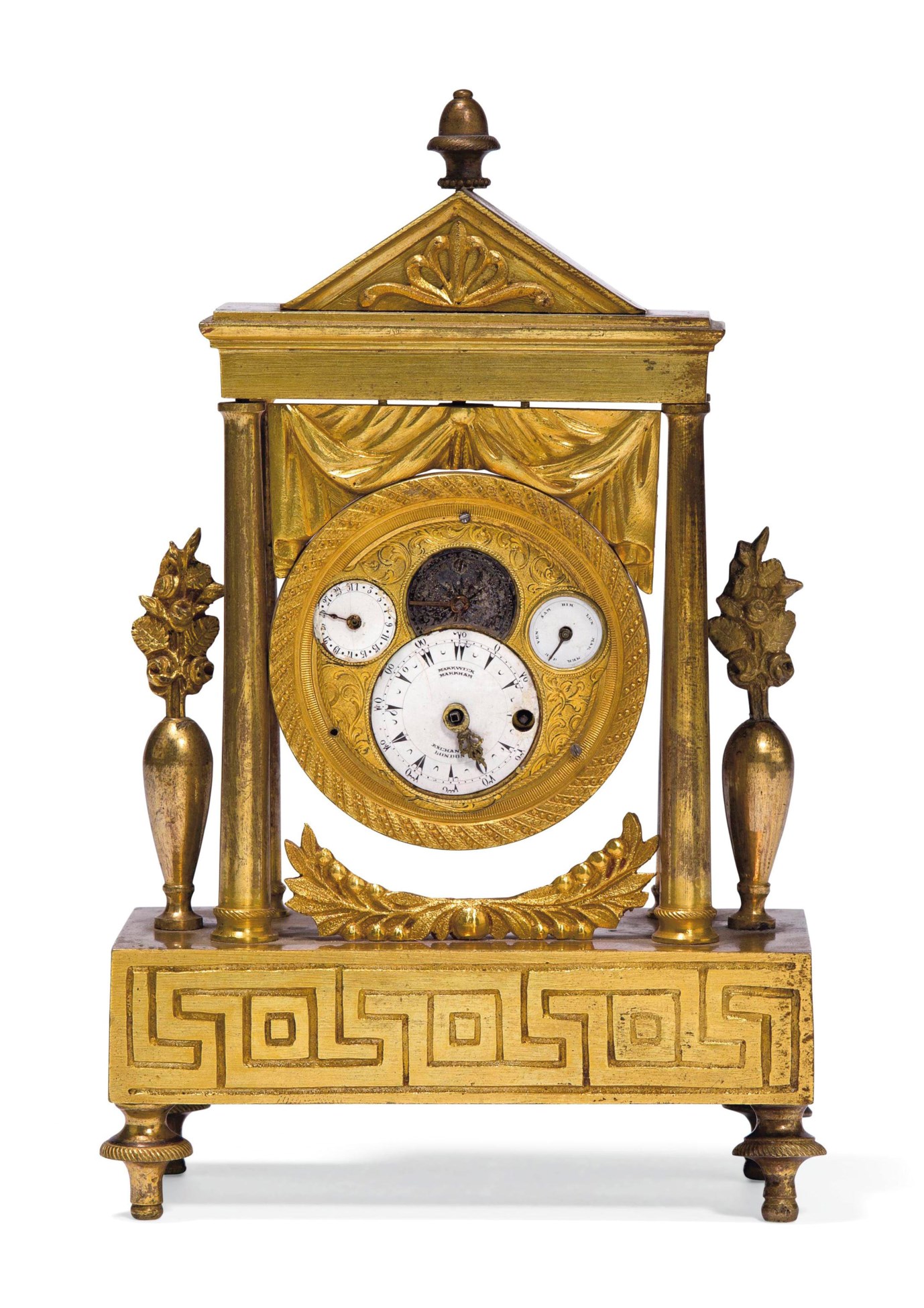 A SMALL ORMOLU TIMEPIECE TABLE CLOCK MADE FOR THE TURKISH MARKET