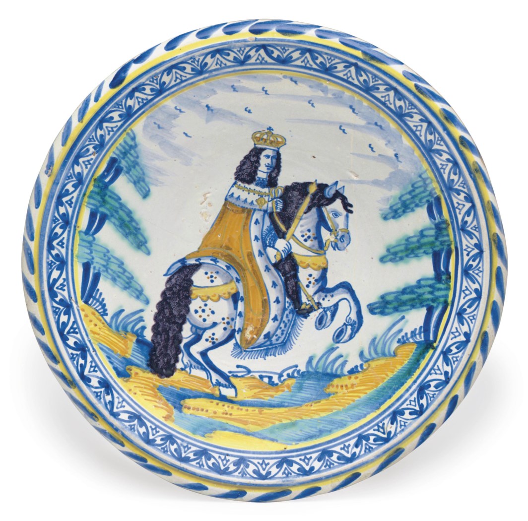 A LONDON DELFT BLUE-DASH POLYCHROME ROYAL EQUESTRIAN PORTRAIT CHARGER ...