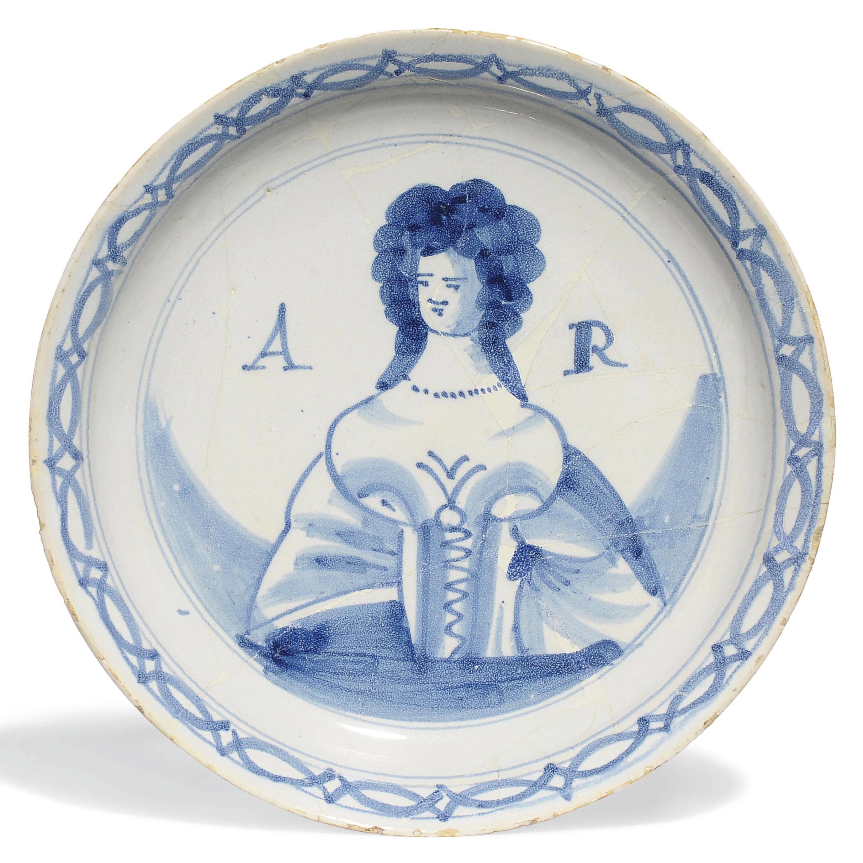 AN ENGLISH DELFT BLUE-DASH ROYAL PORTRAIT CHARGER OF WILLIAM III ...