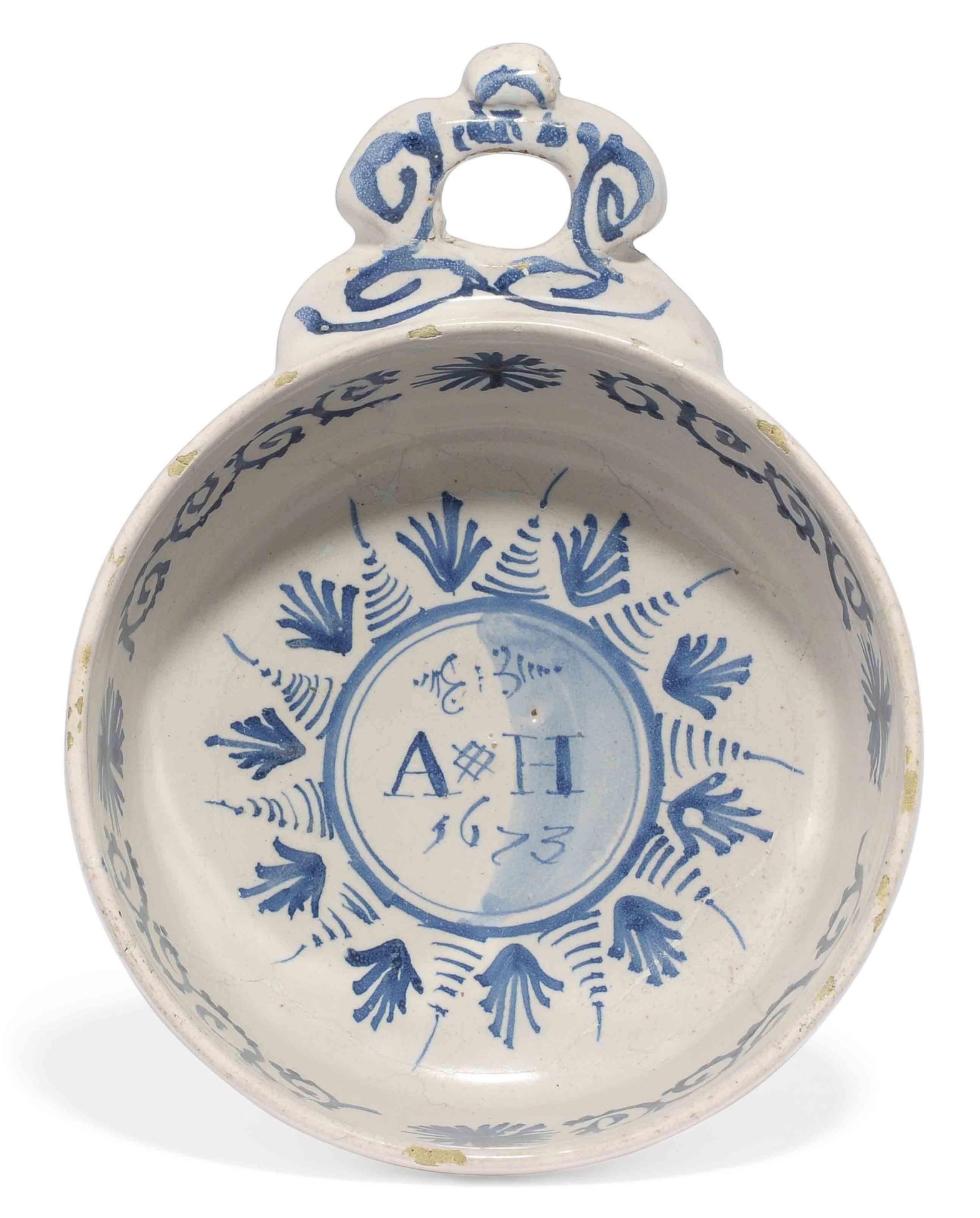 A LONDON DELFT BLUE AND WHITE DATED PORRINGER OR BLEEDING-BOWL , 1673 ...