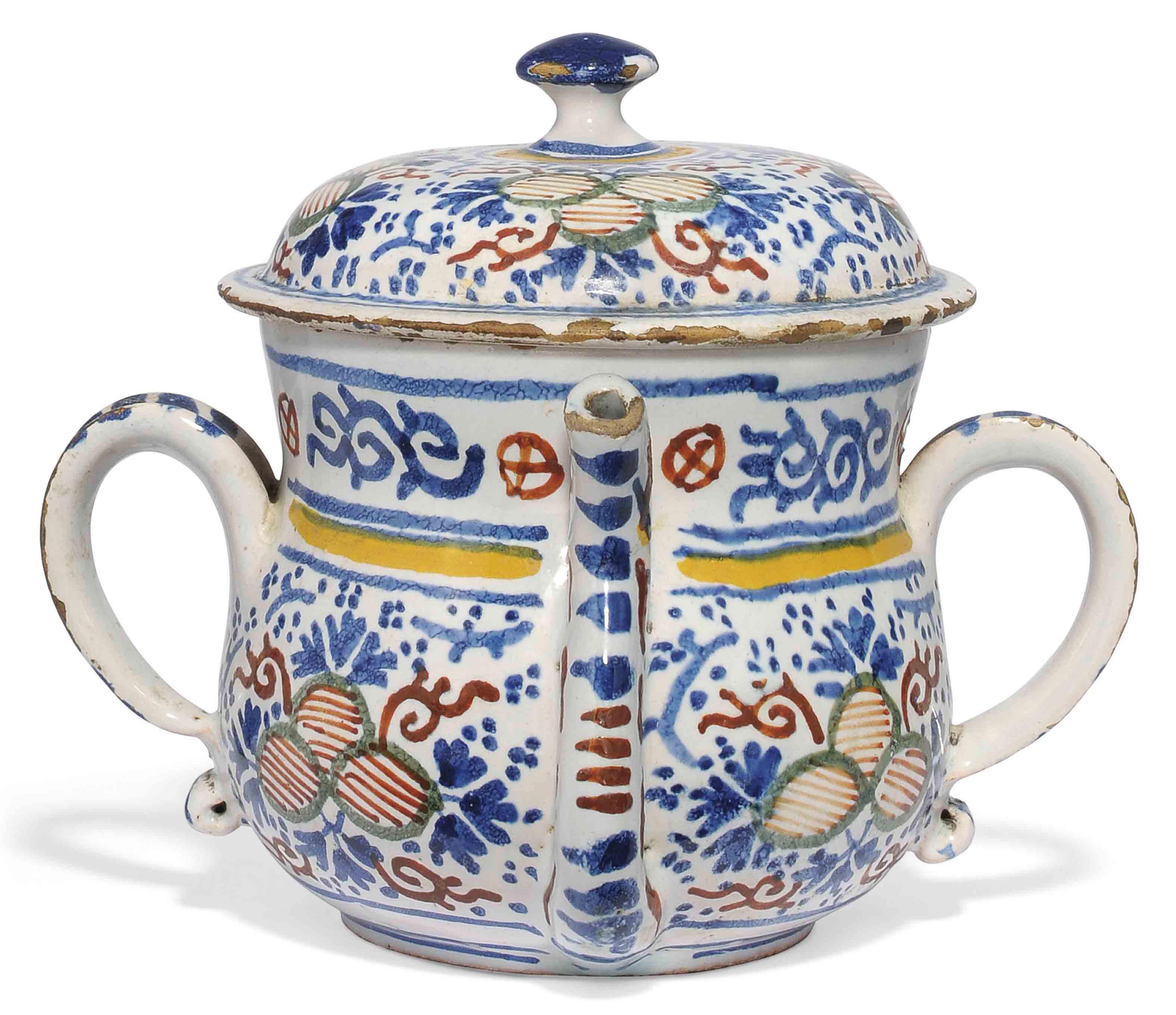 AN ENGLISH SLIPWARE HONEY-POT , CIRCA 1700, PROBABLY STAFFORDSHIRE ...