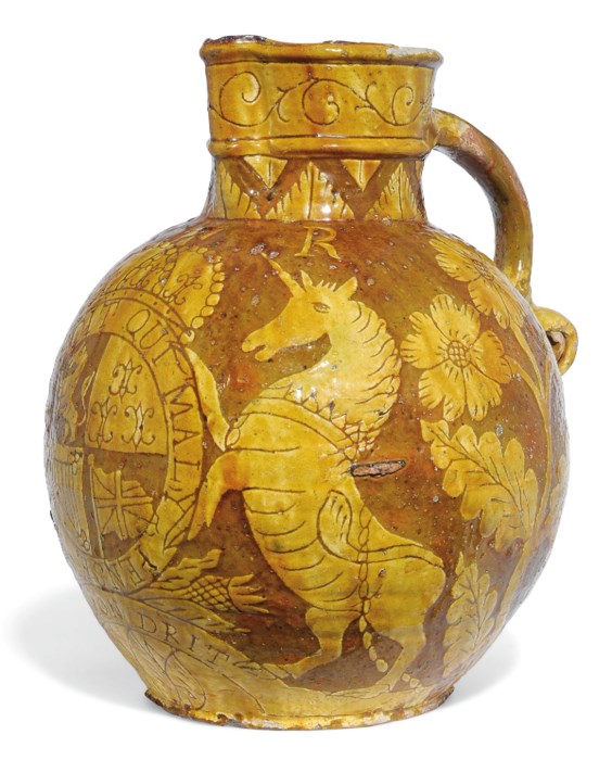 A NORTH DEVON SLIPWARE SGRAFFITO-DECORATED DATED ARMORIAL JUG , 1791 ...