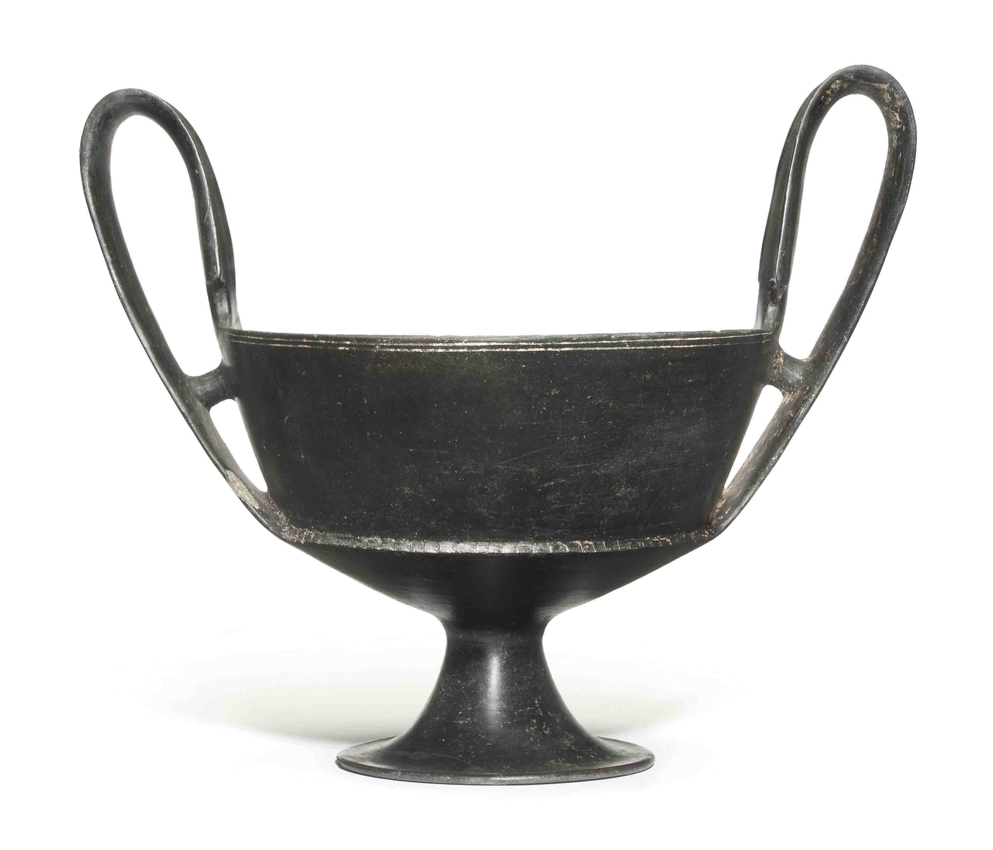 AN ETRUSCAN BUCCHERO KANTHAROS , CIRCA 600-550 B.C. | Christie's
