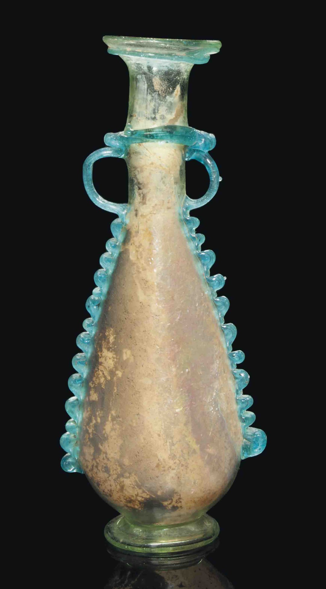A LATE ROMAN OR BYZANTINE PALE GREEN GLASS AMPHORA