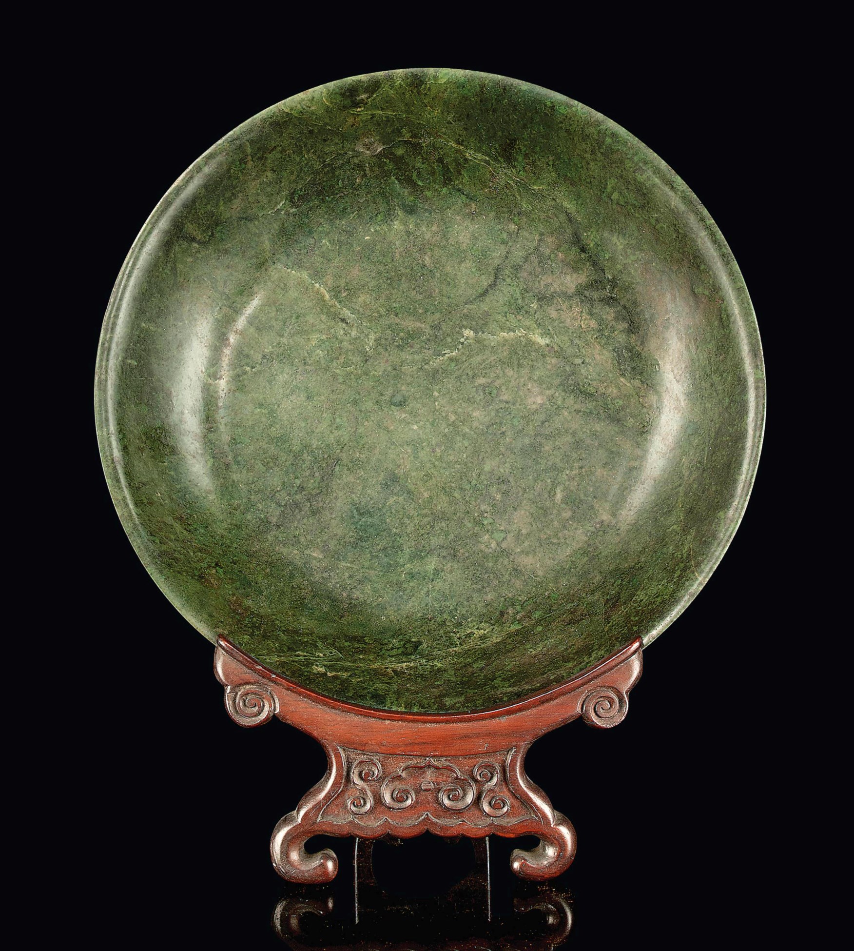 A LARGE SPINACH-GREEN JADE DISH , 18TH CENTURY | Christie's