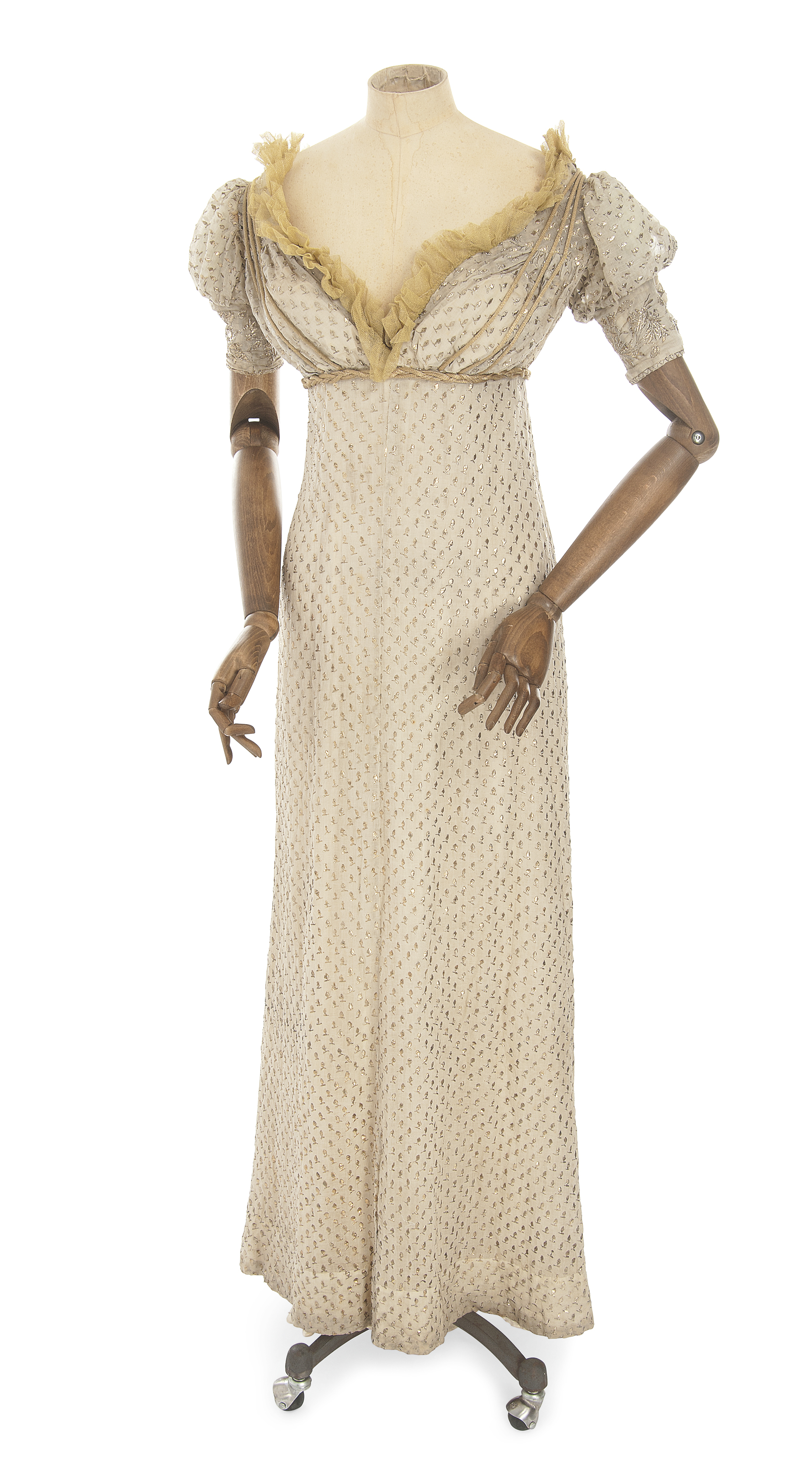 A LADY'S DRESS OF FINE MUSLIN EMBROIDERED WITH GILT METAL IN THE ...