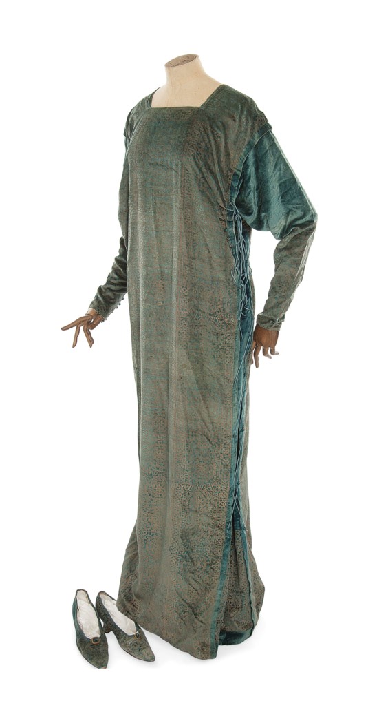 A FULL LENGTH VELVET 'TABARD' GOWN AND A PAIR OF MATCHING SHOES