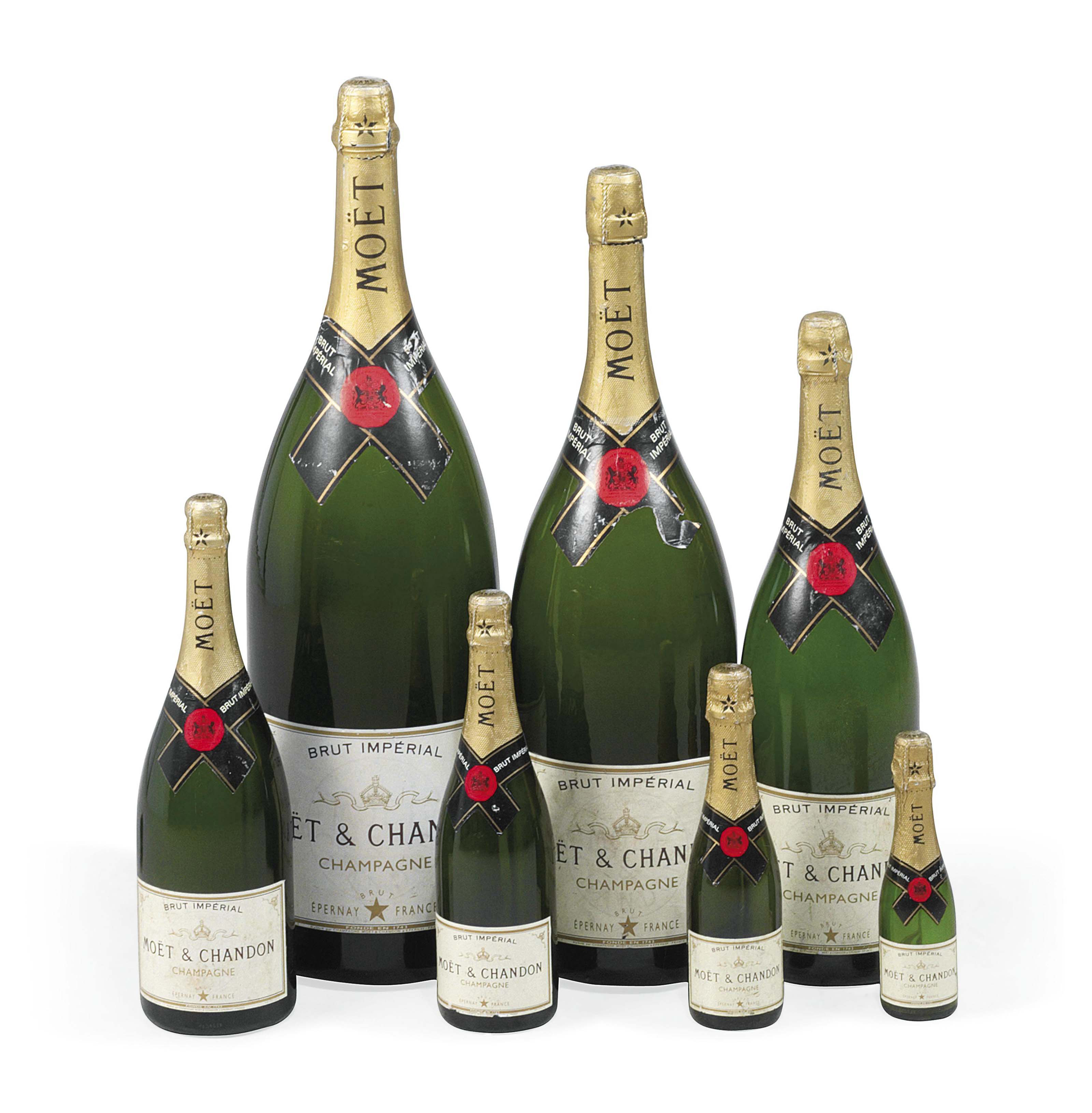 A GRADUATED SET OF SEVEN MOET & CHANDON CHAMPAGE DISPLAY BOTTLES , MID ...