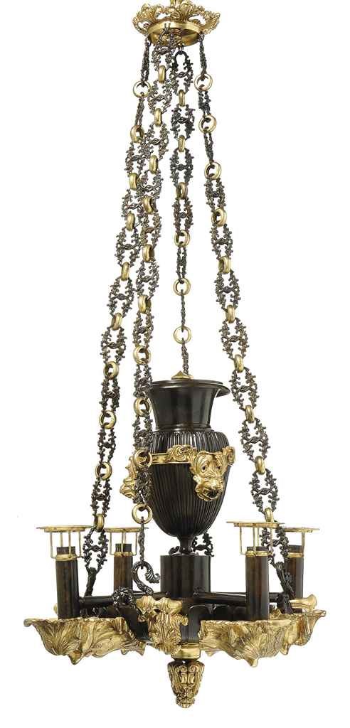 A REGENCY GILT AND PATINATED BRONZE COLZA-OIL FOUR-LIGHT CHANDELIER