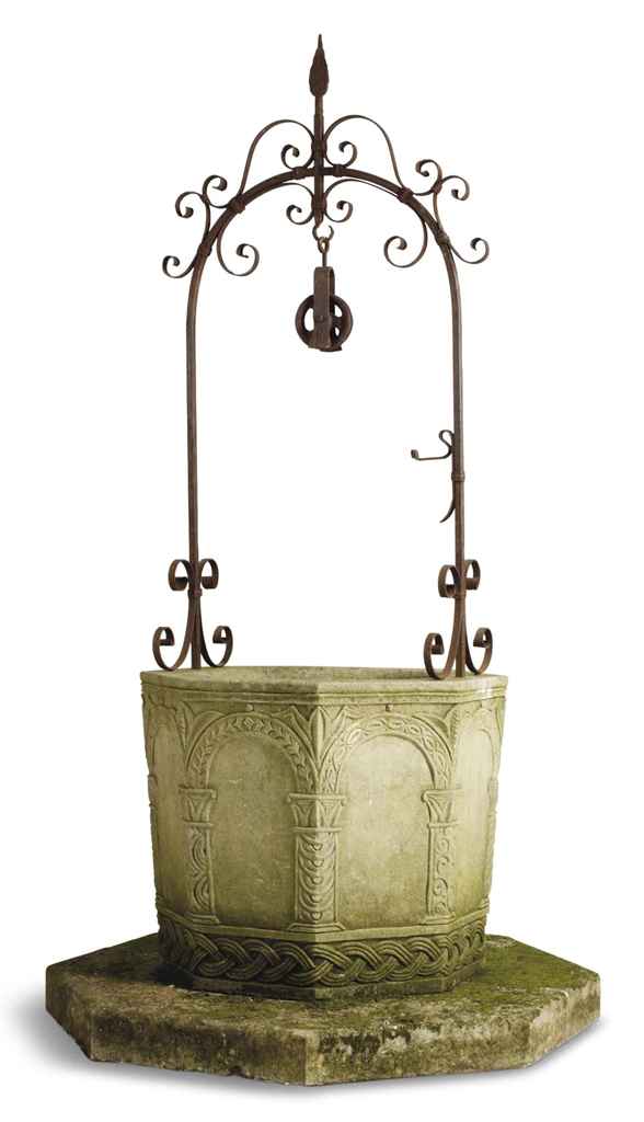 A LIMESTONE WELL HEAD