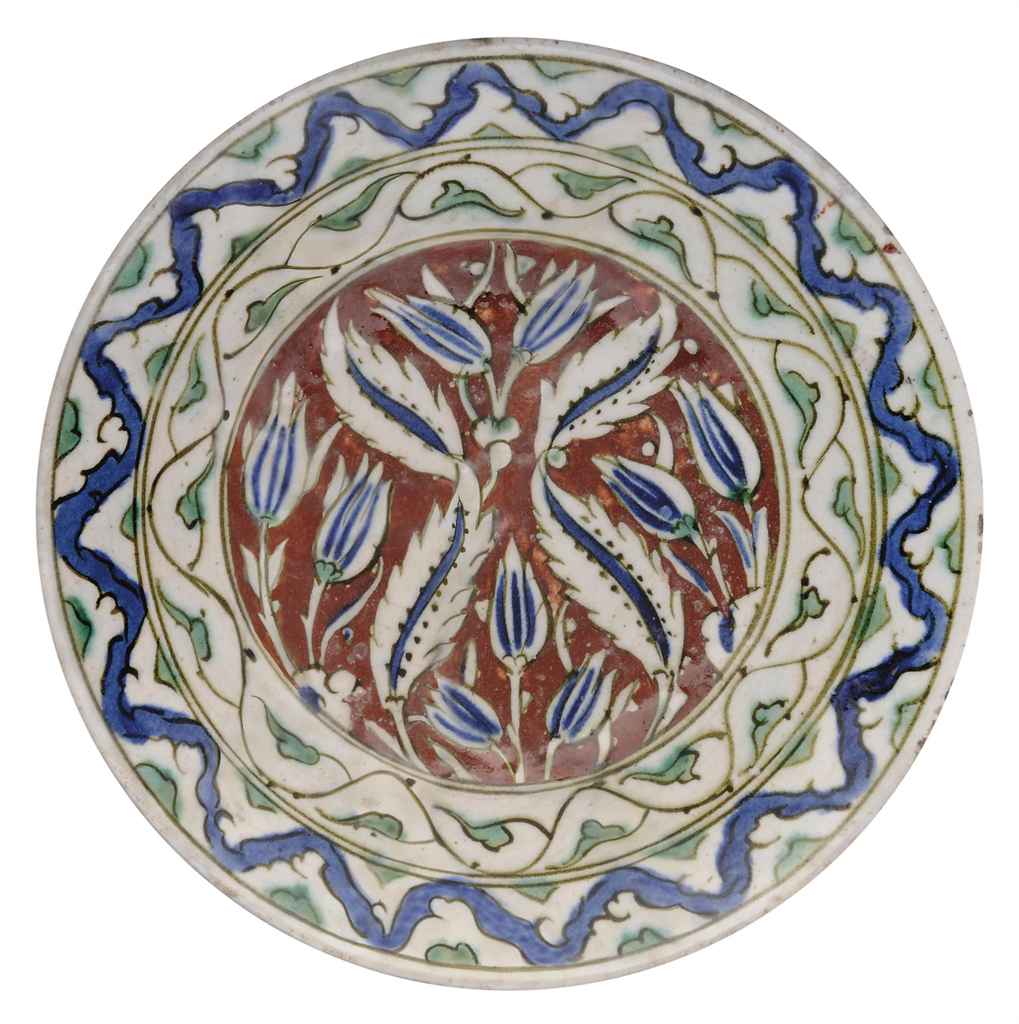 AN IZNIK POTTERY DISH , OTTOMAN TURKEY, EARLY 17TH CENTURY | Christie's
