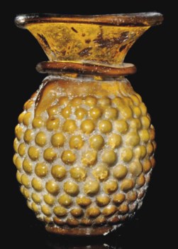 A ROMAN AMBER GLASS GRAPE FLASK , CIRCA 2RD-3RD CENTURY A.D. | Christie's