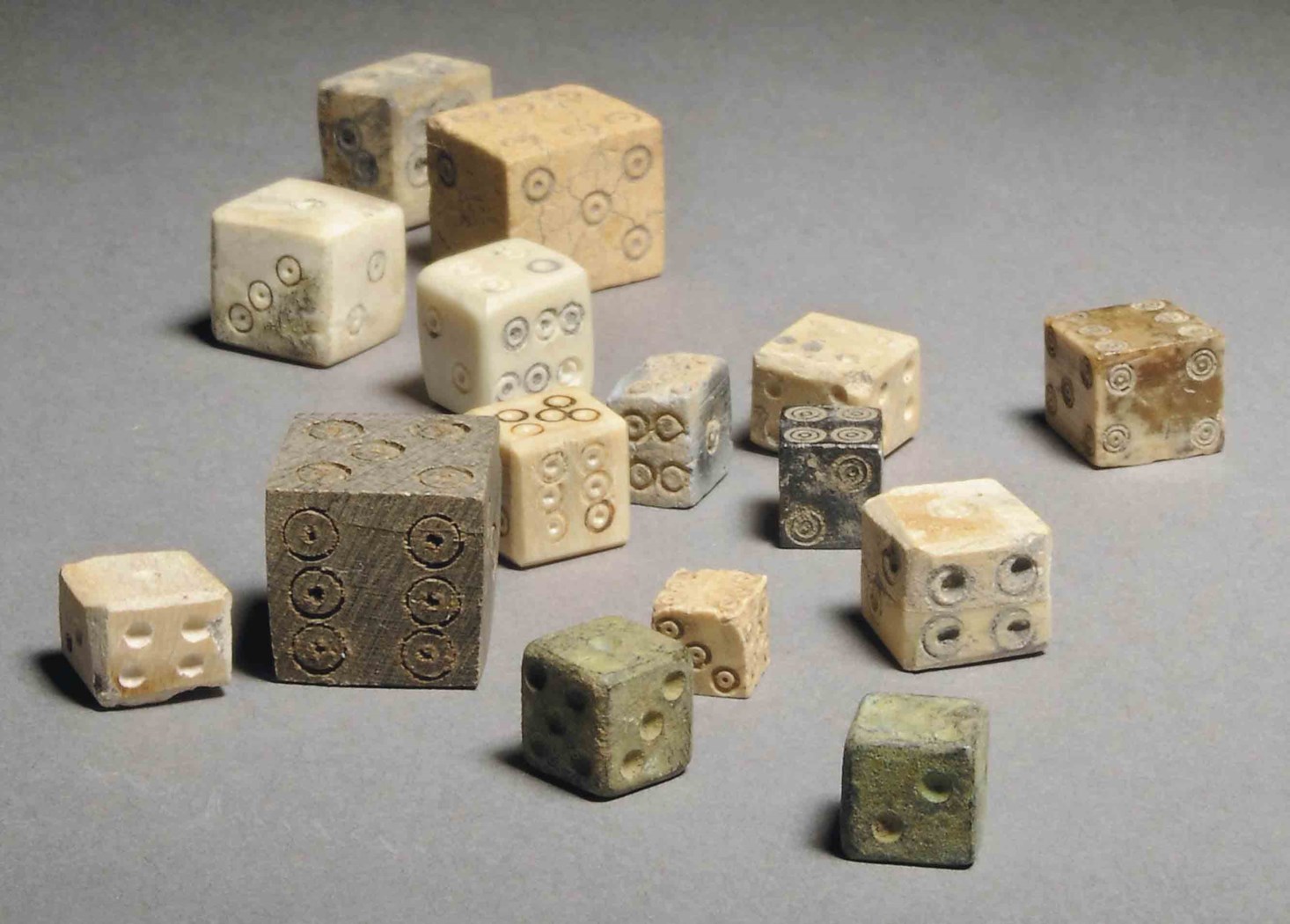 FIFTEEN ROMAN BONE, WOOD AND BRONZE DICE
