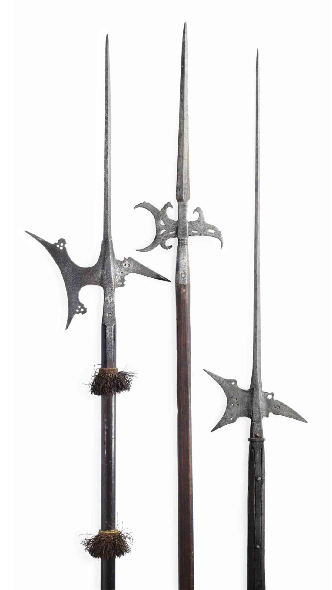 A HALBERD AND THREE DECORATIVE HALBERDS , THE FIRST LATE 16TH CENTURY ...
