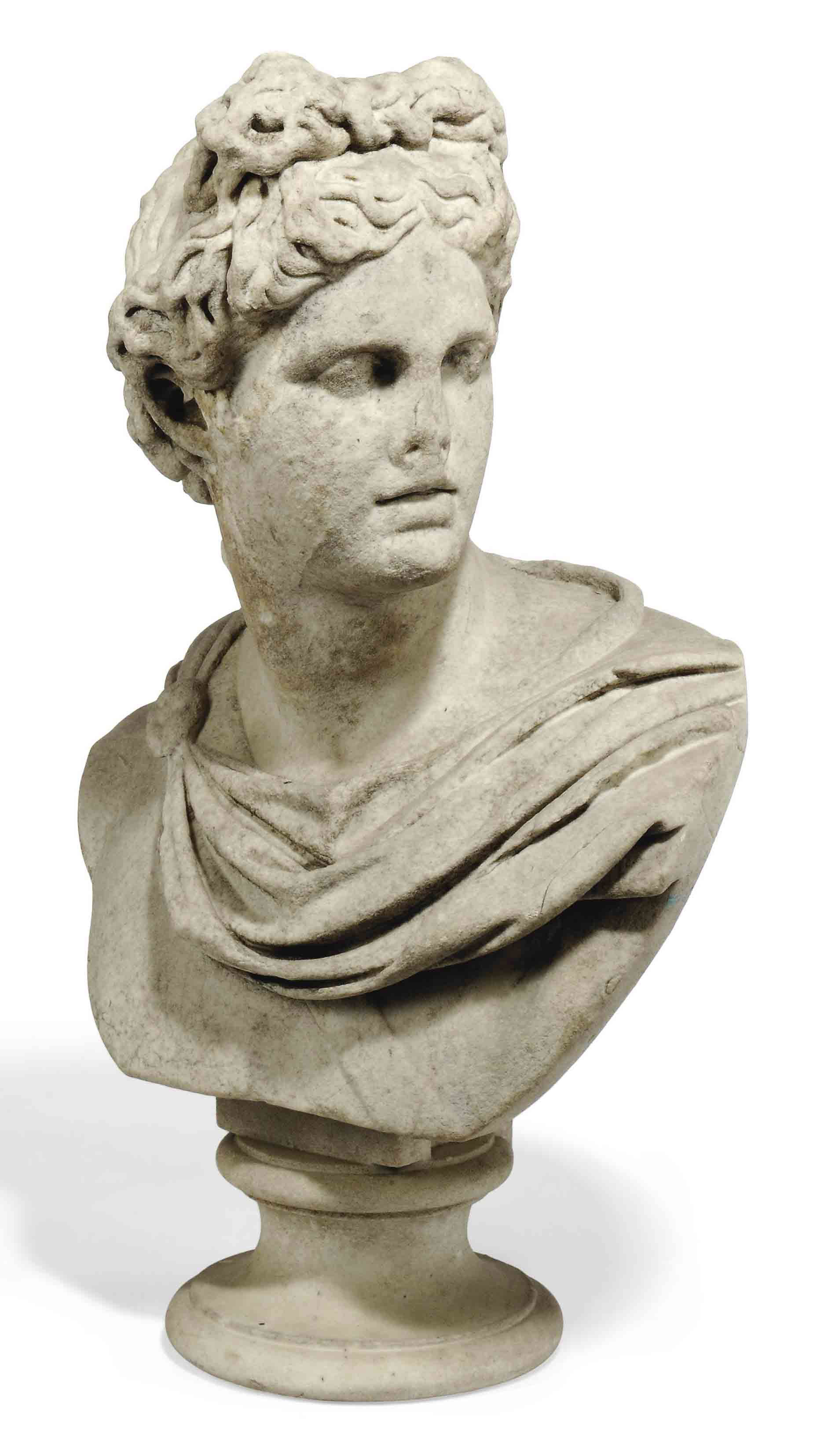 A CARVED MARBLE BUST OF THE APOLLO BELVEDERE