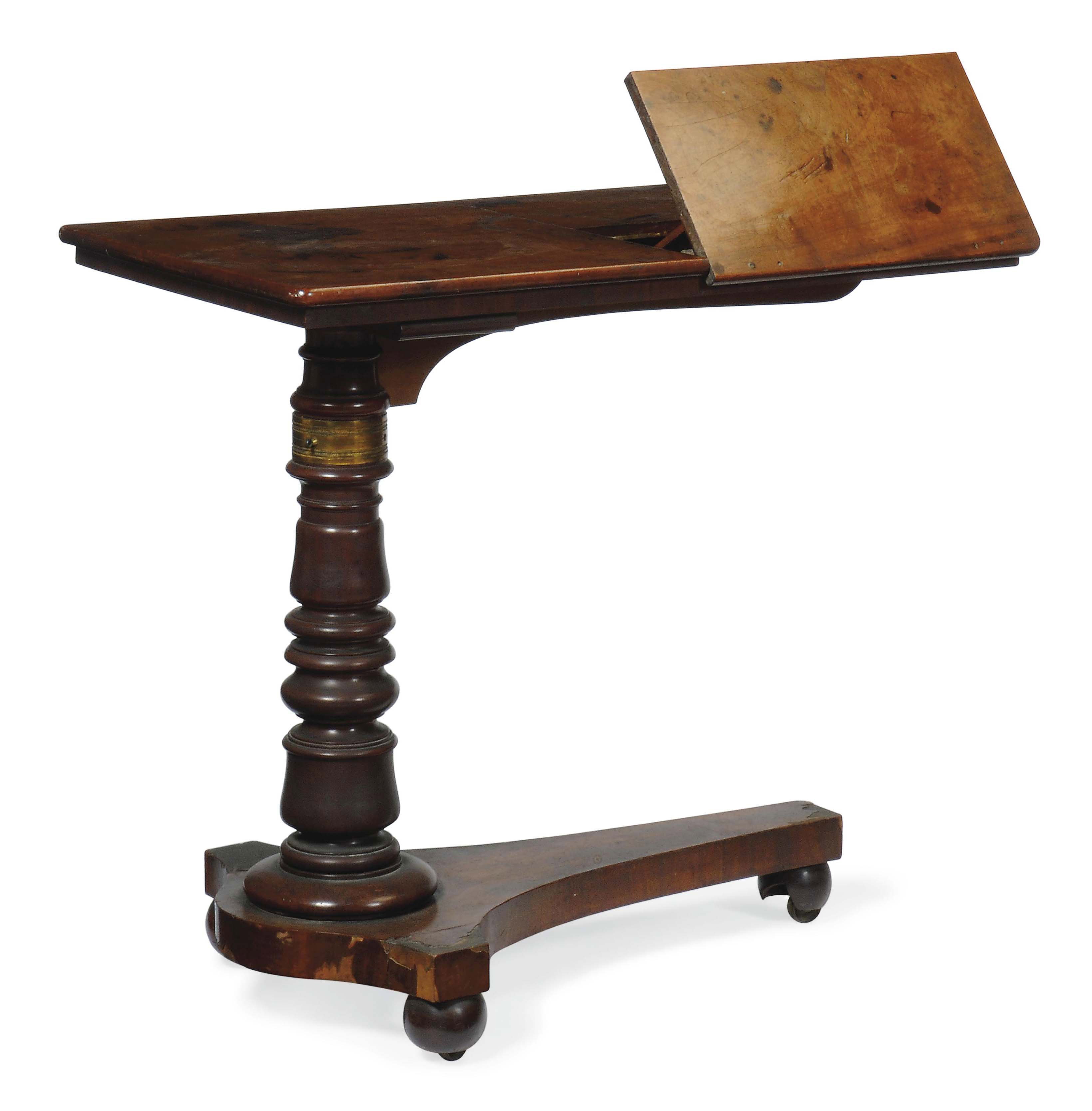 AN EARLY VICTORIAN MAHOGANY READING TABLE