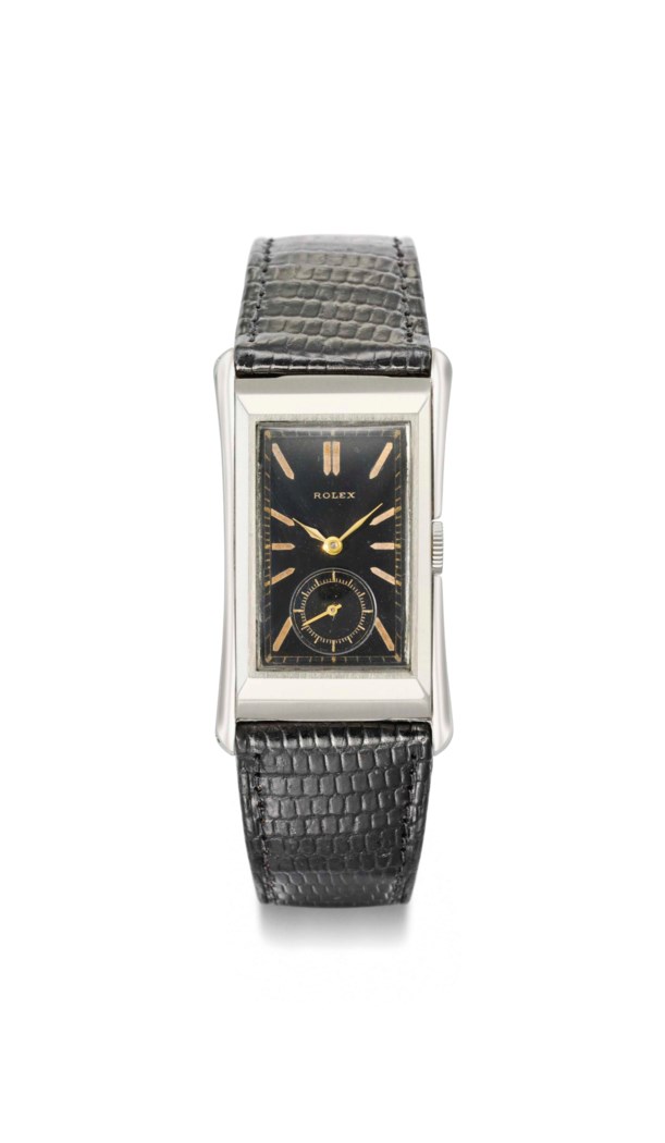 Rolex. An attractive stainless steel rectangular curved wristwatch with ...