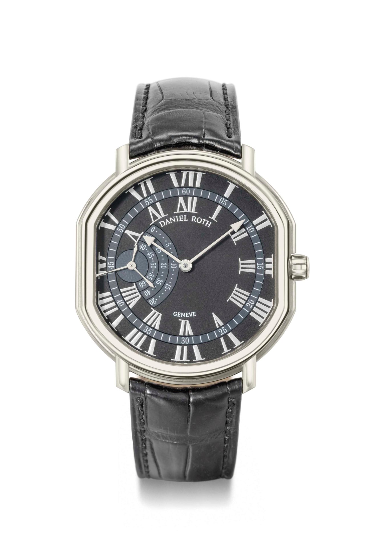 Daniel Roth. A large 18K white gold barrel-shaped wristwatch with ...