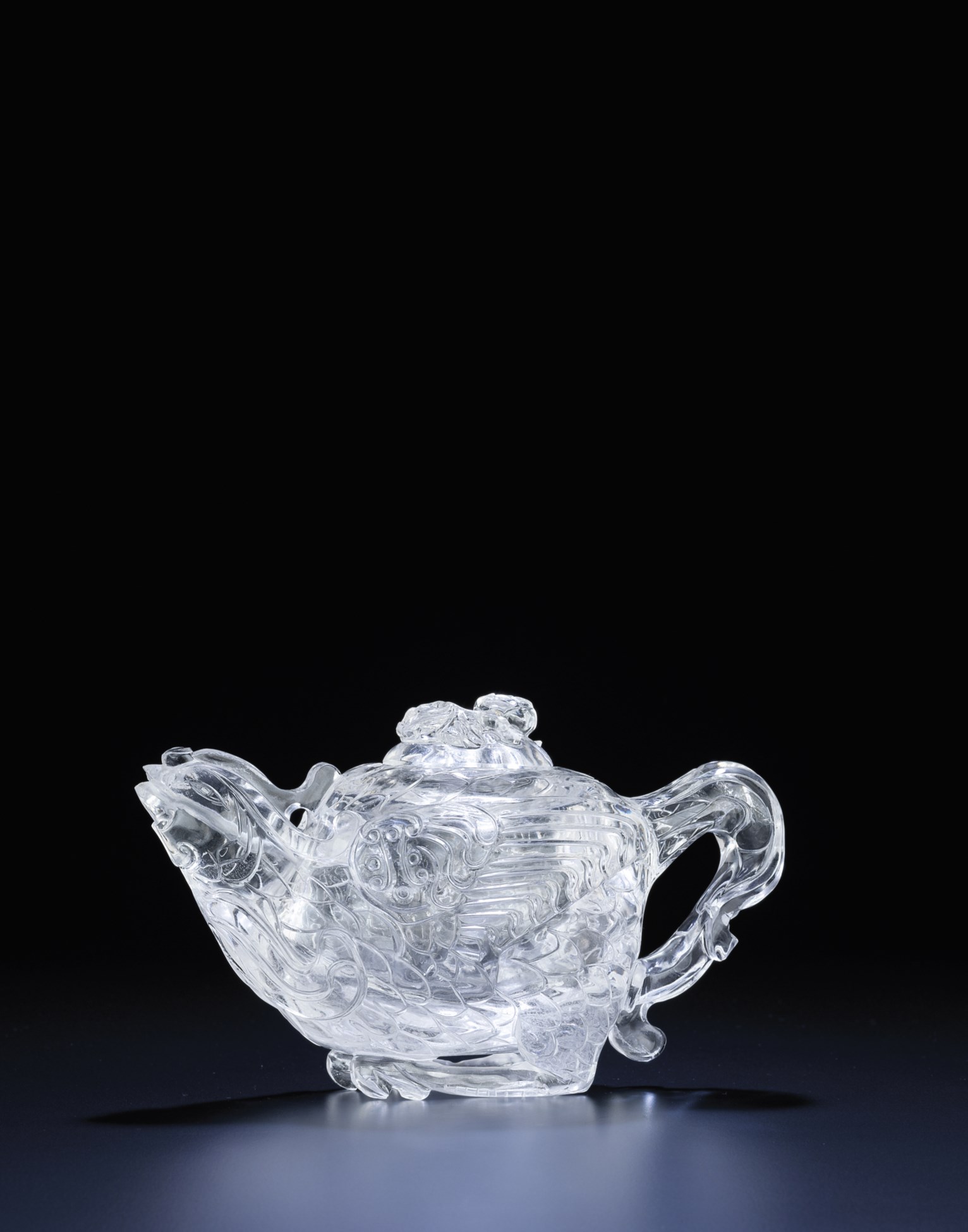 A LARGE ROCK CRYSTAL TEAPOT AND COVER , 水晶雕鳳穿牡丹蓋壺 | Christie's