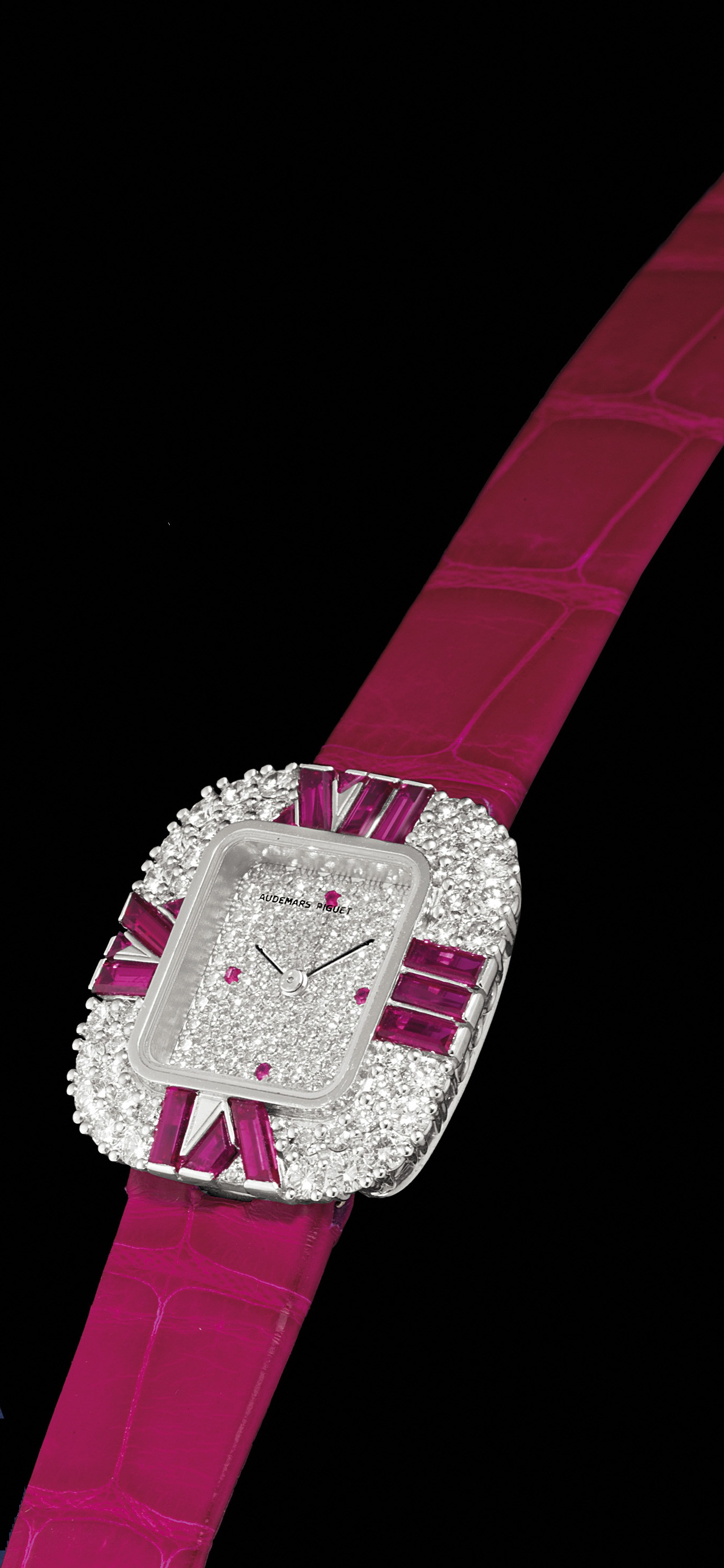 AUDEMARS PIGUET. A LADY'S FINE 18K WHITE GOLD, RUBY AND DIAMOND-SET ...