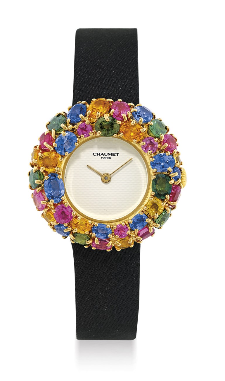 CHAUMET. A LADY'S 18K GOLD AND MULTI-COLOURED GEM-SET WRISTWATCH ...