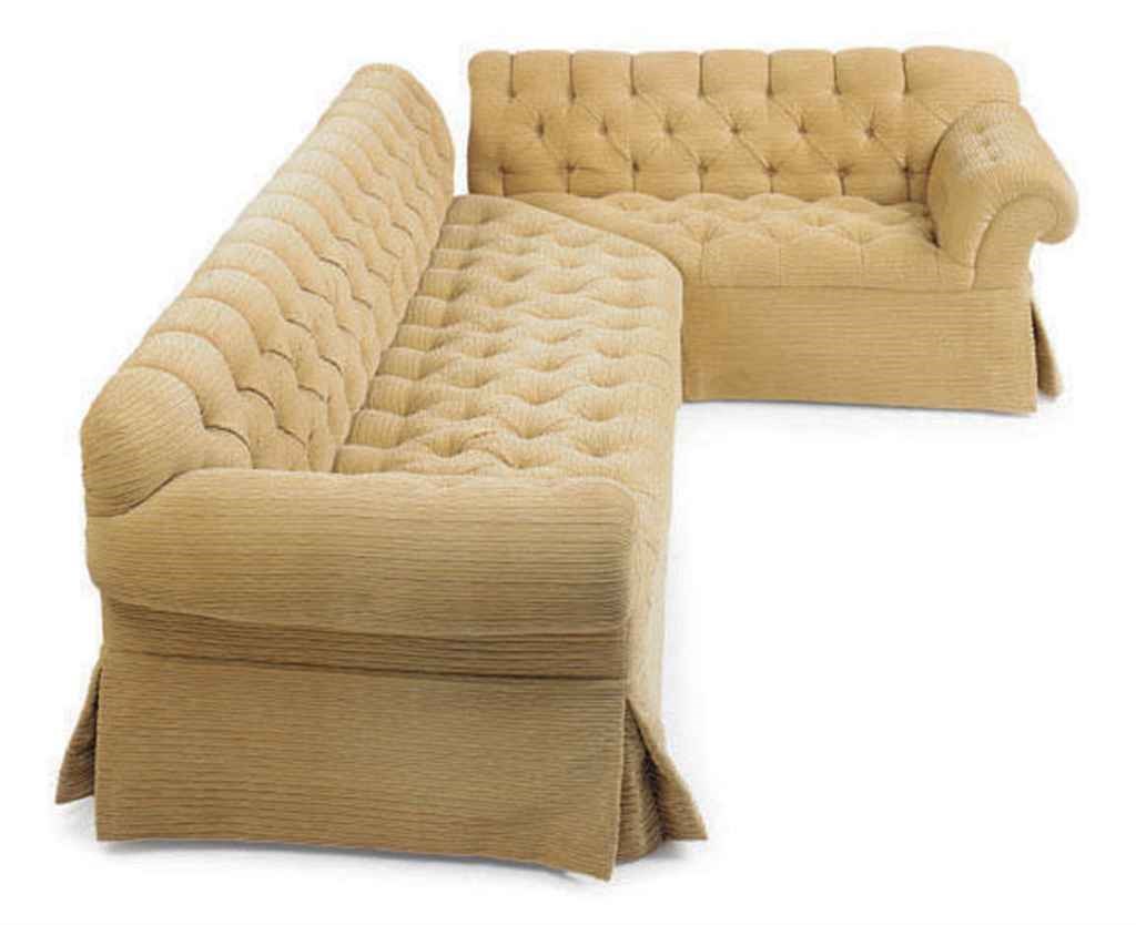 A BUTTON-TUFTED TAN CORDUROY-UPHOLSTERED TWO-PIECE SECTIONAL SOFA ...