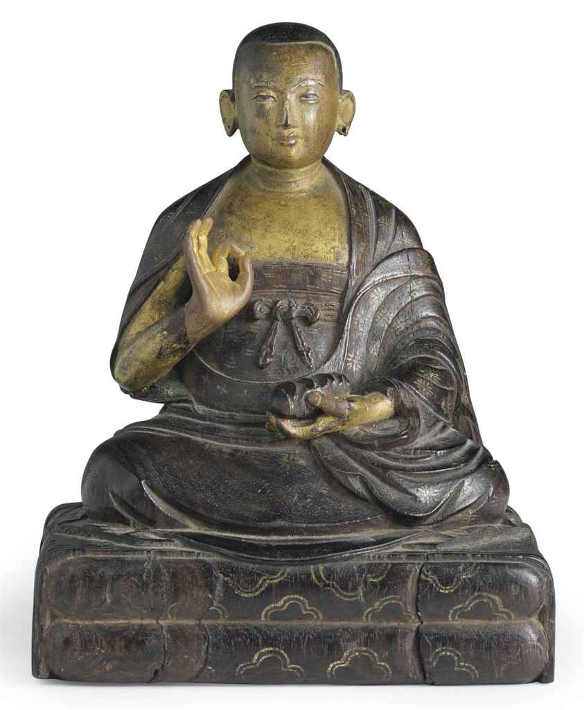 A Zitan wood figure of an Arhat , TIBET, CIRCA 17TH CENTURY | Christie's