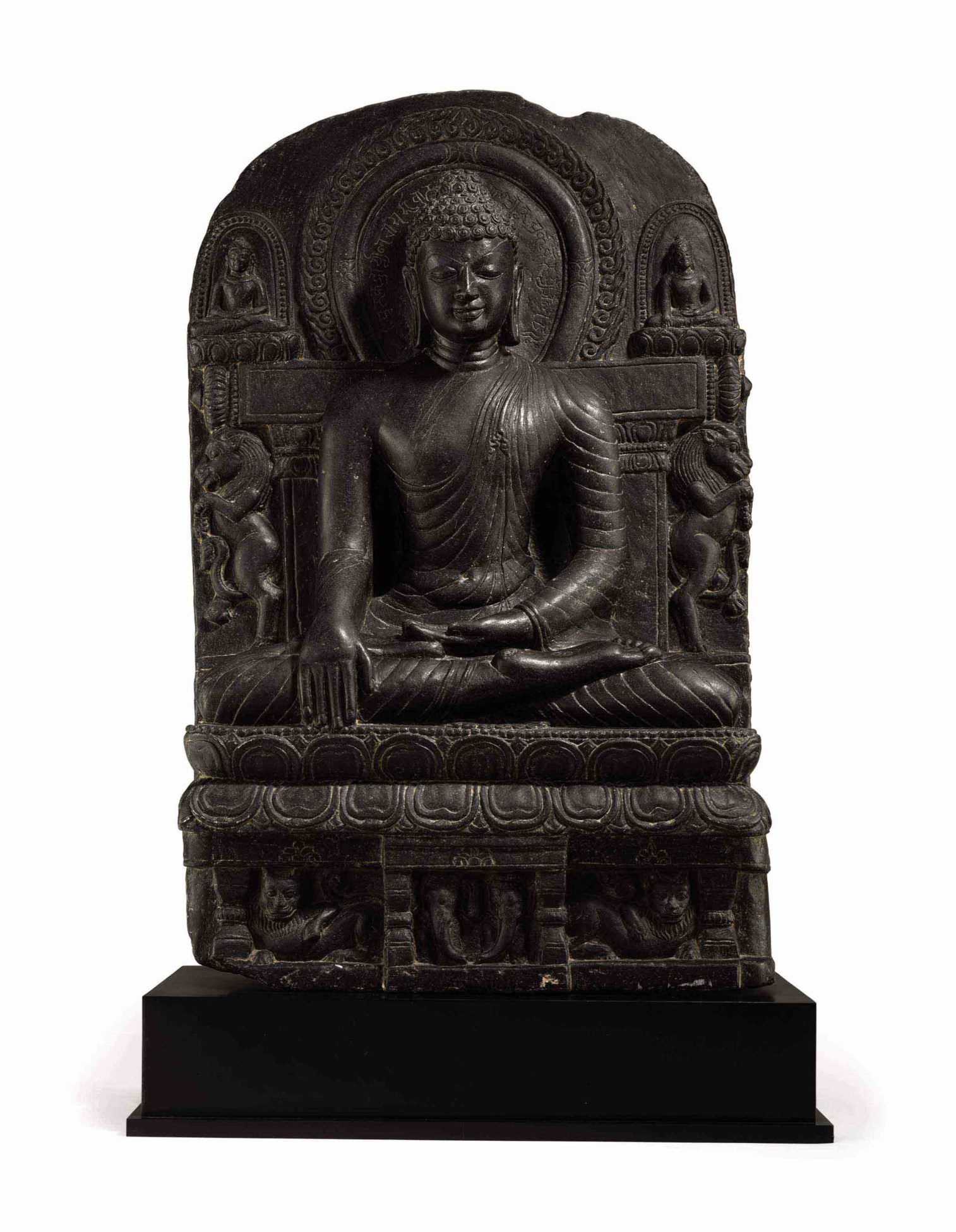 A black stone stele of seated Buddha , NORTHEASTERN INDIA, PALA PERIOD ...