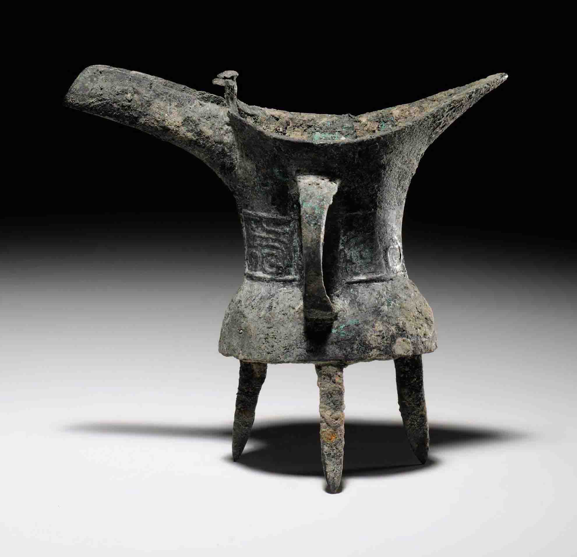 A BRONZE OCTALOBED MIRROR , TANG DYNASTY (618-907) | Christie's