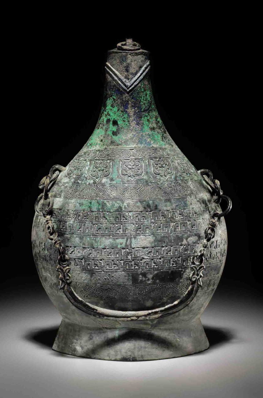 AN UNUSUAL BRONZE FLASK , LATE SPRING AND AUTUMN/EARLY WARRING STATES ...