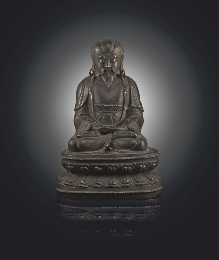 A BRONZE FIGURE OF A SEATED LUOHAN , 18TH CENTURY | Christie's