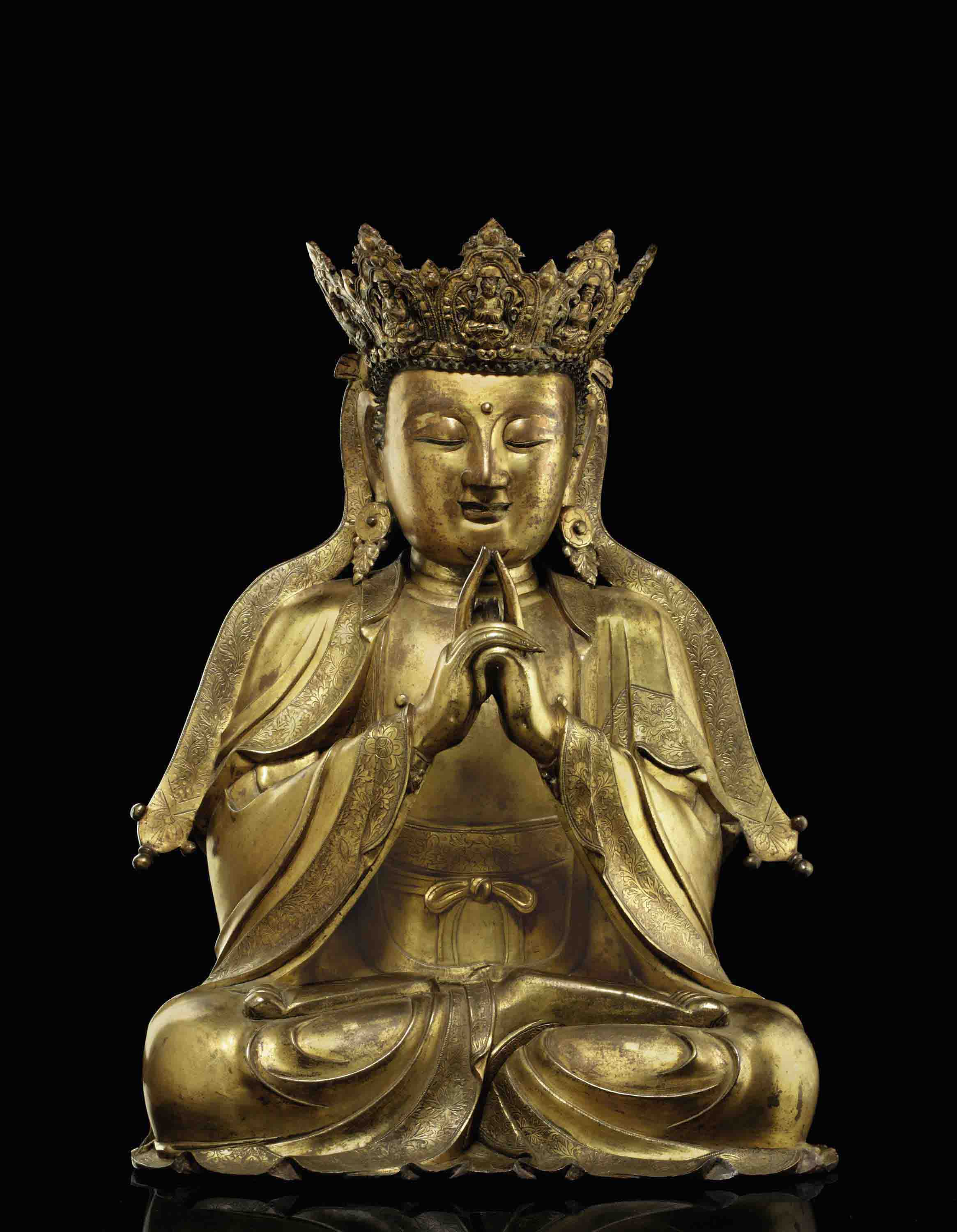 A VERY RARE LARGE FINELY CAST GILT-BRONZE FIGURE OF VAIROCANA